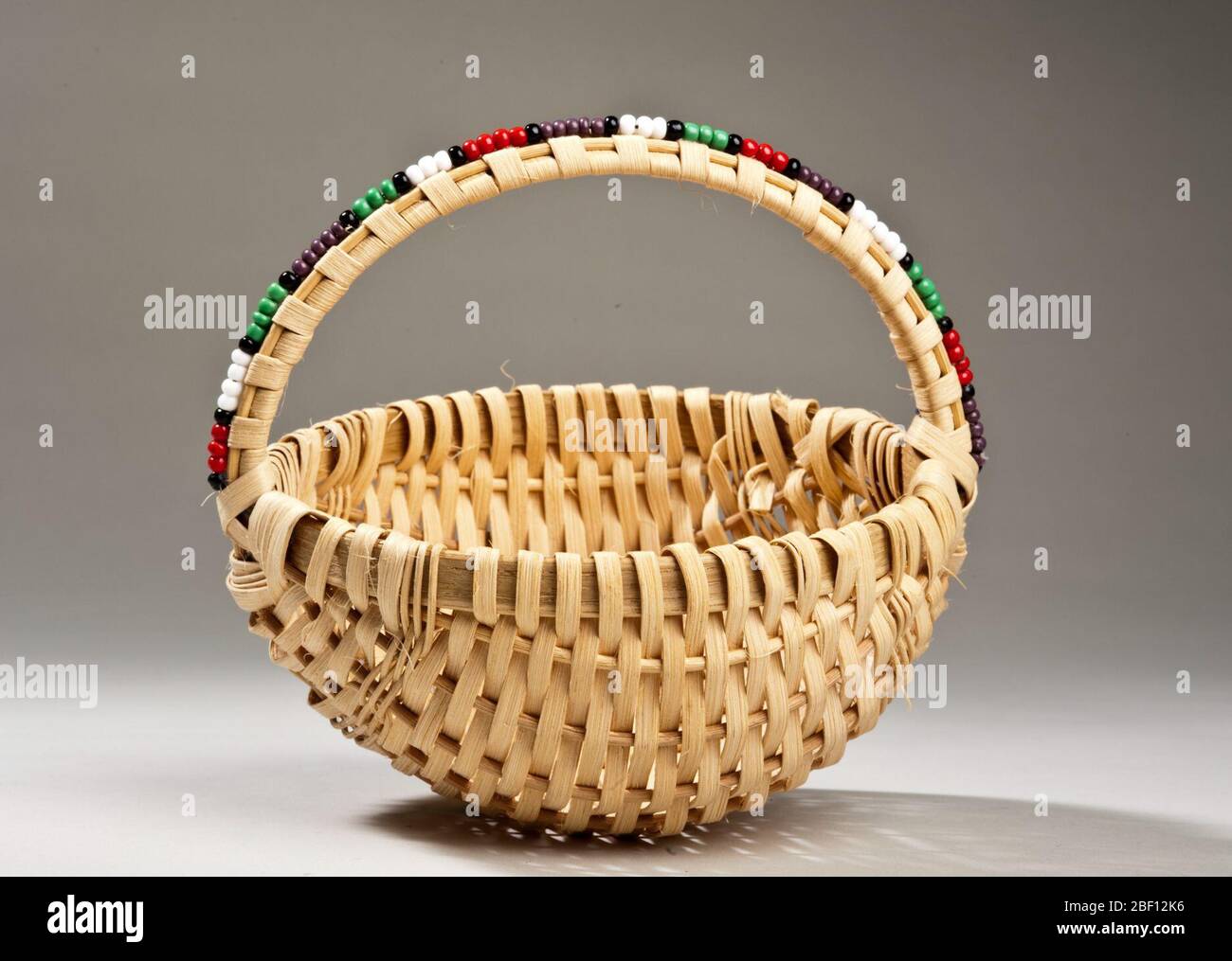 Handmade Reed Basket with Beaded Handle Stock Photo - Alamy