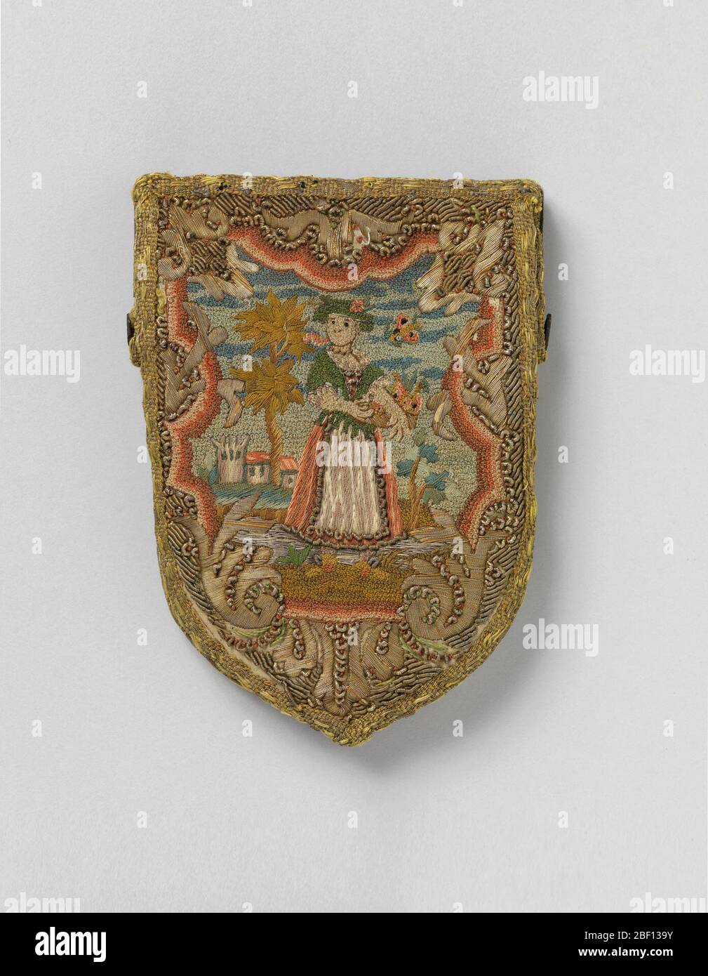 Purse. Small shield-shaped purse on steel frame with spring catch ...