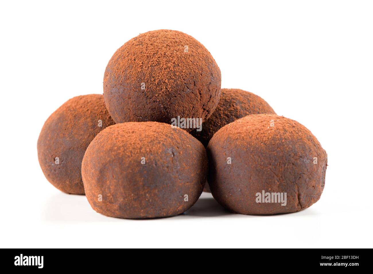 Chocolate truffles isolated on white background Stock Photo - Alamy