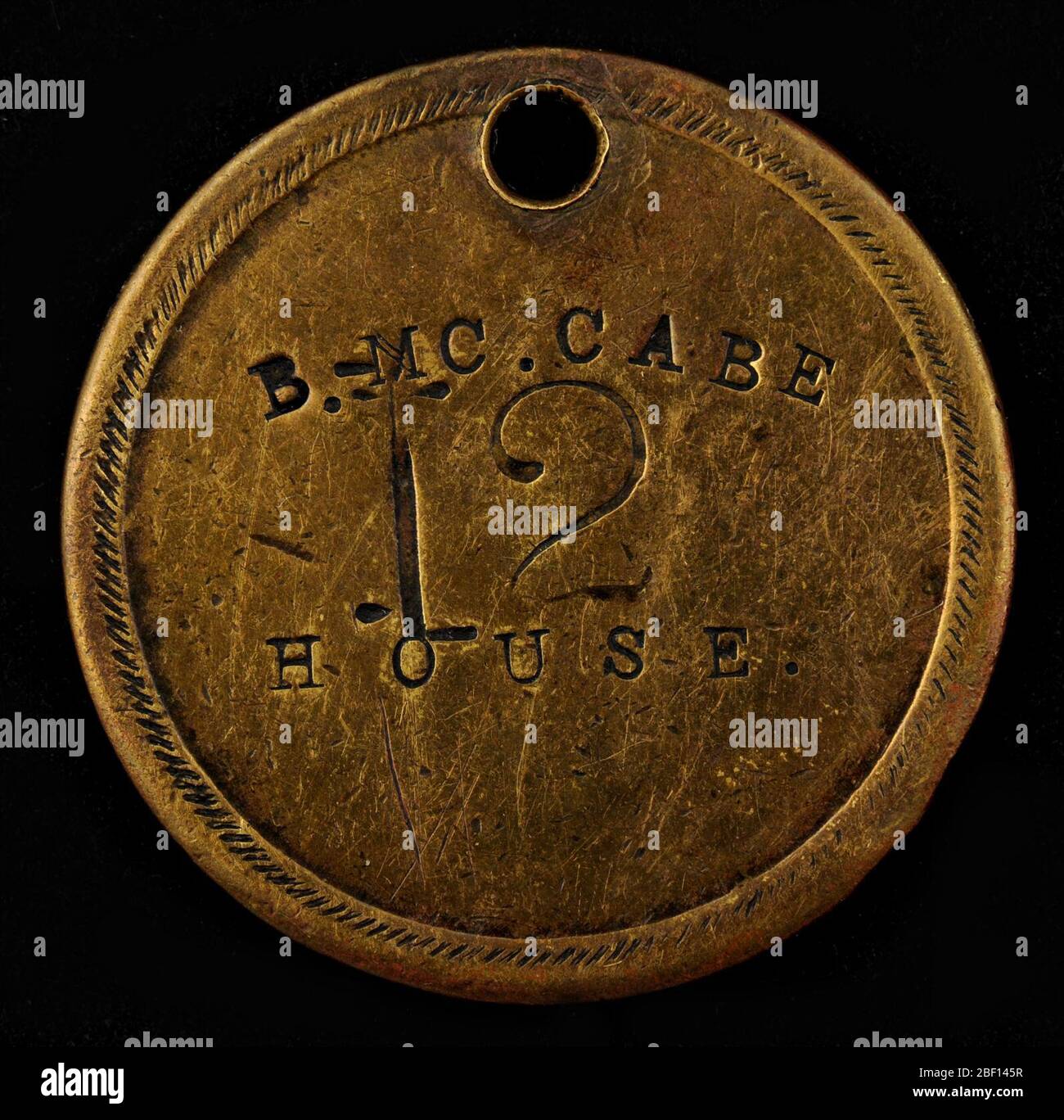 McCabe House Owney tag. Owney may have received this tag from Barney ...
