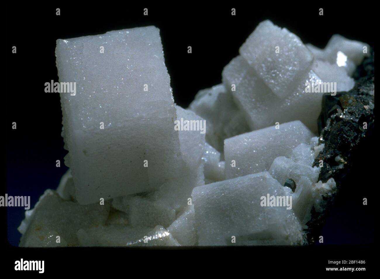 Photograph of cubic calcite crystals (122900) from the National Mineral ...