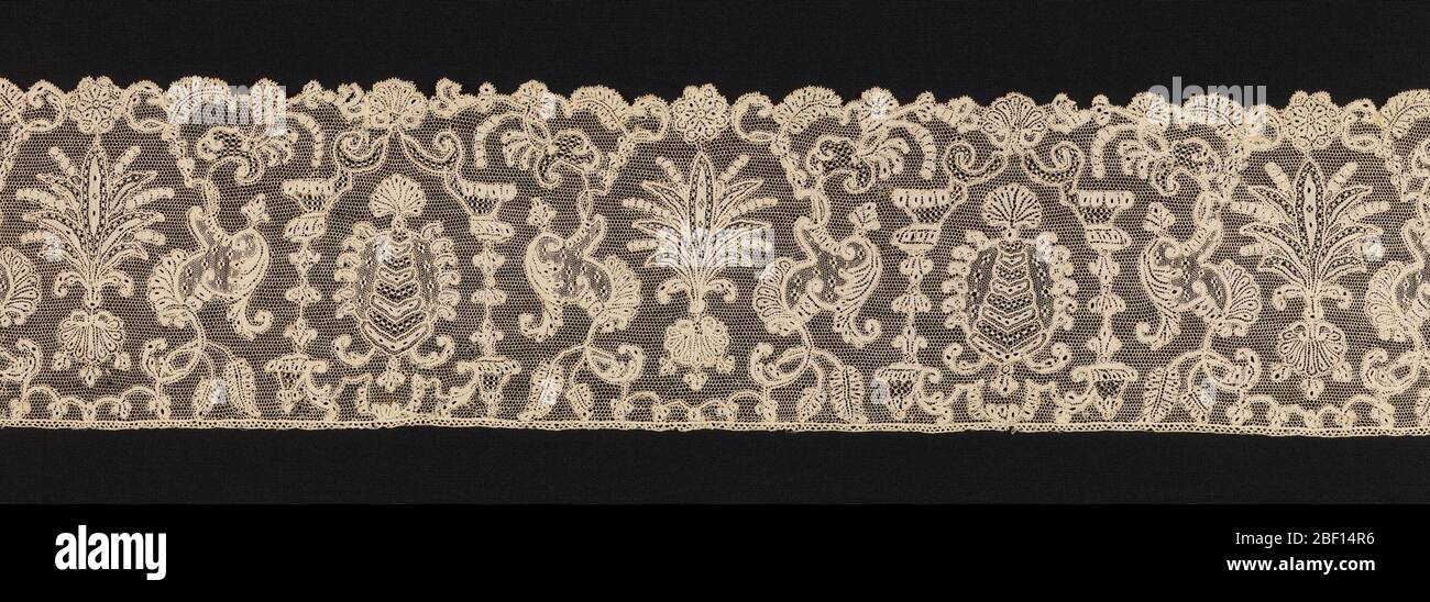 Band. Band in a symmetrical design of stylized palm trees framed by ...
