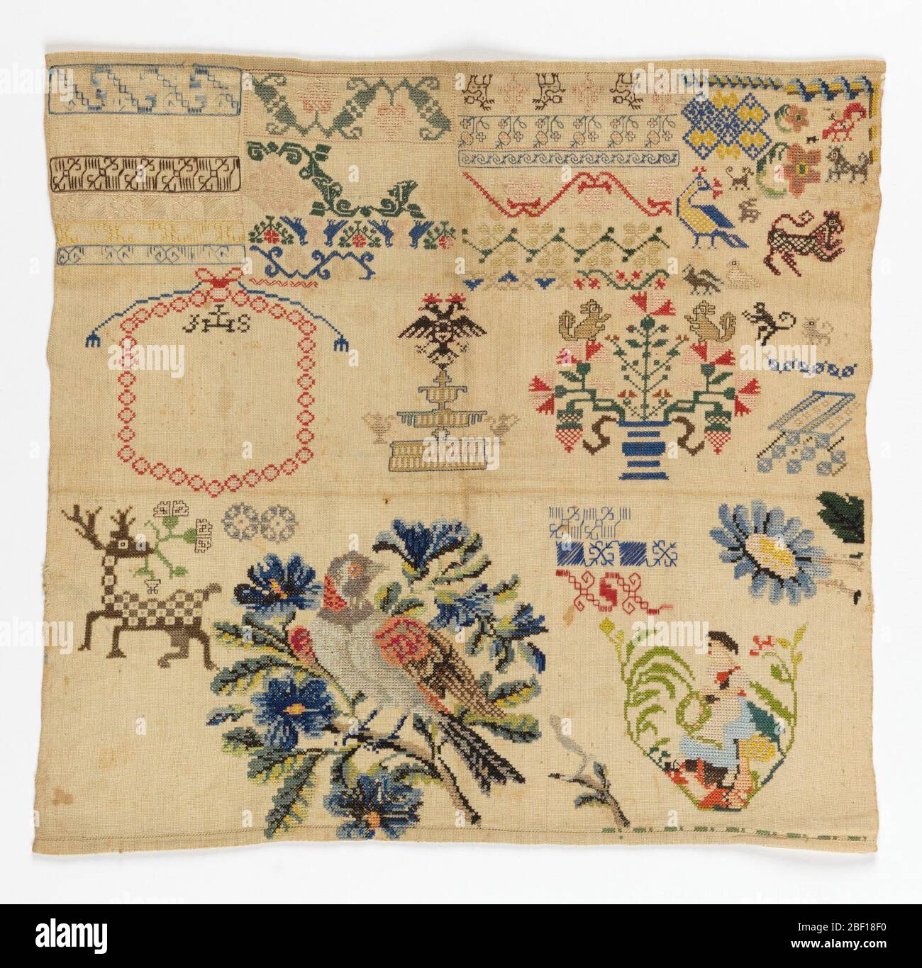 Sampler. Square sampler in two sections. The upper register has bands ...