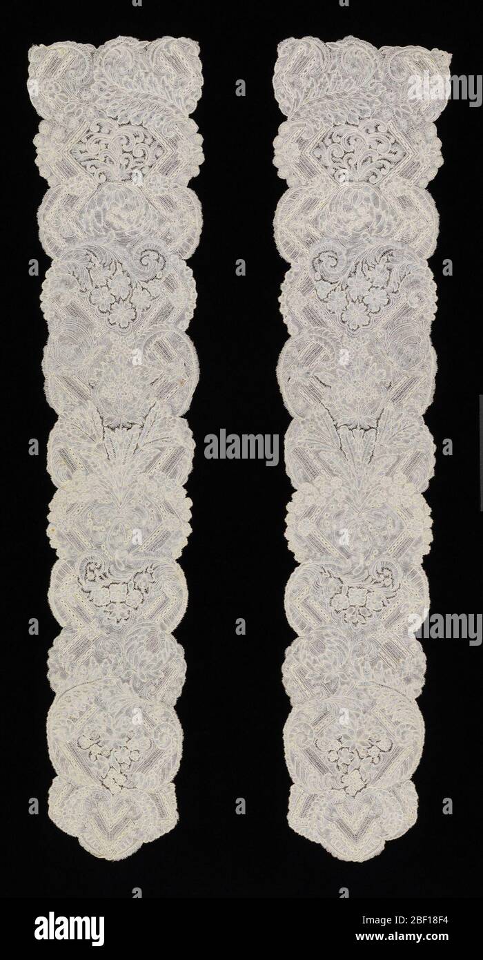 Cap streamers. Pair of cap streamers in a design arranged around a ...