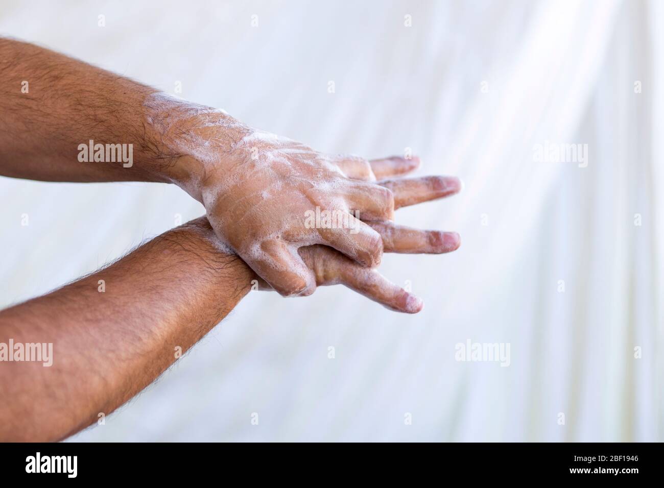 Washing your hands the right way Stock Photo - Alamy