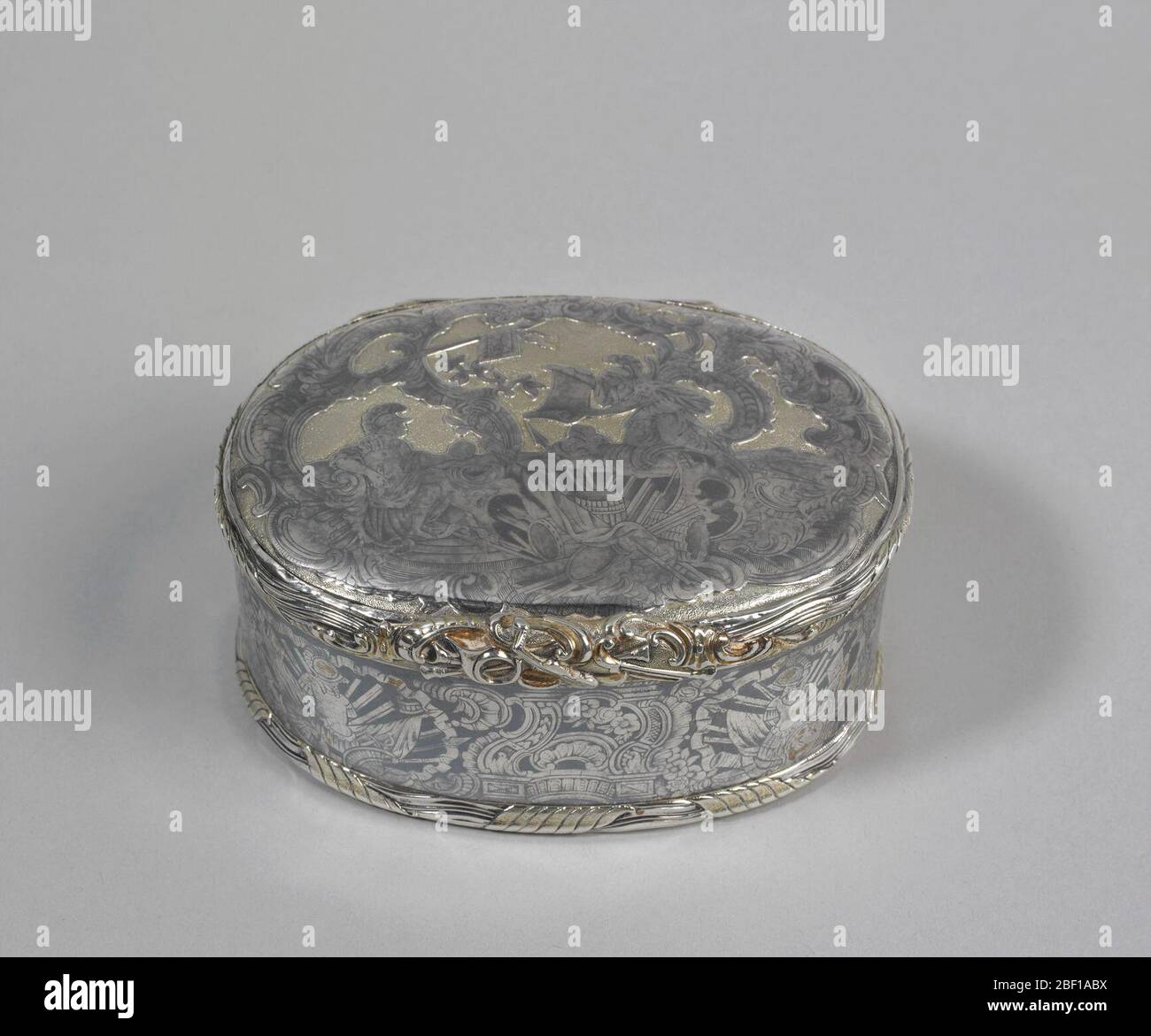 Box. Oval box with hinged cover; niello decoration, on box alternating ...