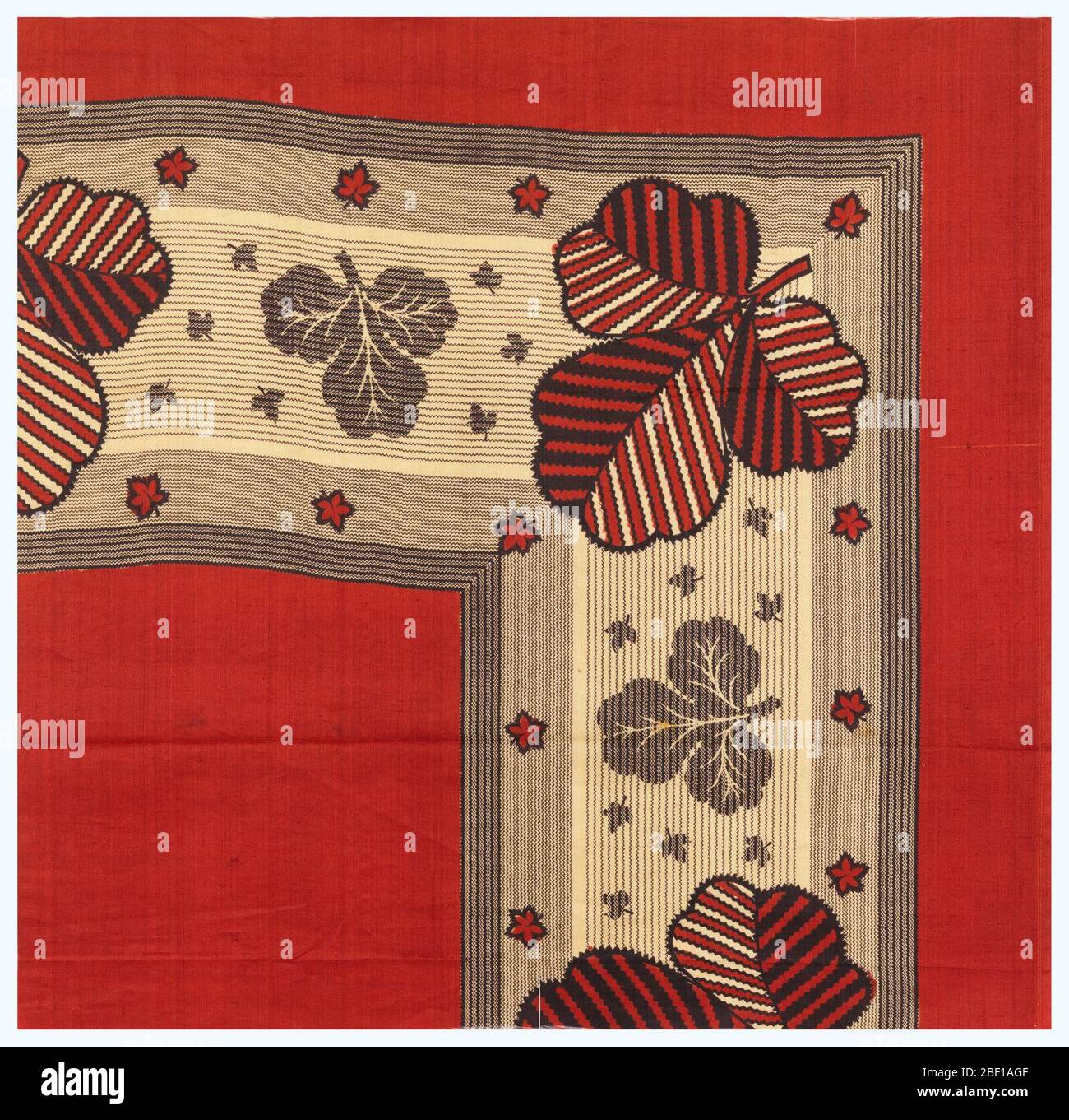 Scarf sample. Quarter of a printed scarf in red and black. Shows field ...