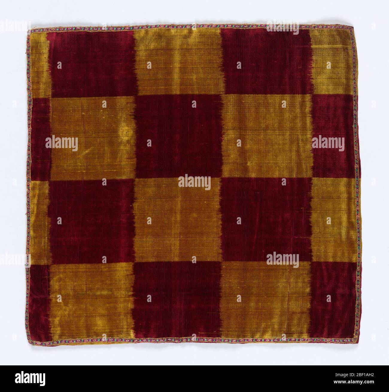 Textile. Small piece of woven velvet with a checkerboard pattern of ...