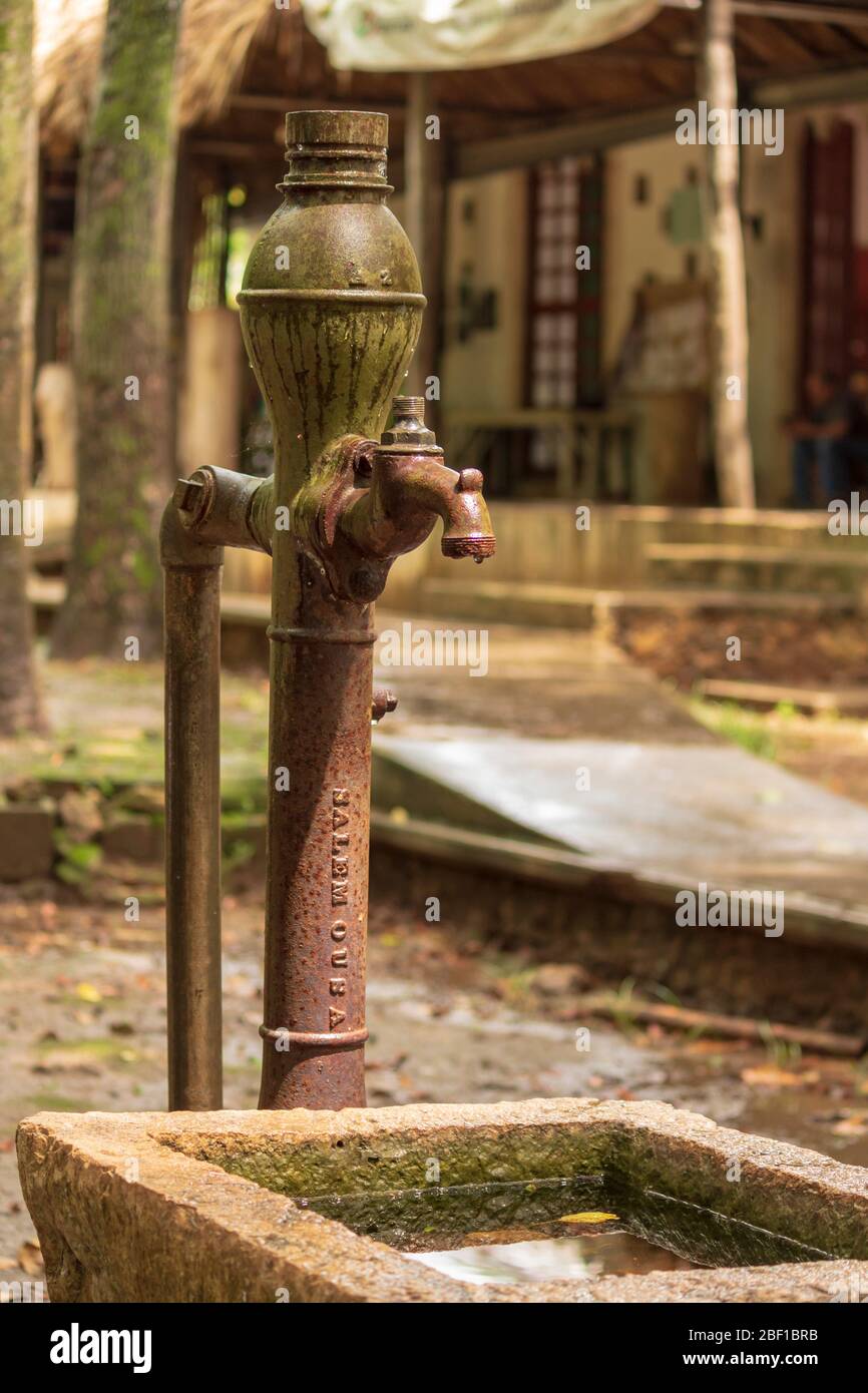 Old colonial water pump in Mexican town. Although its parts are still ...