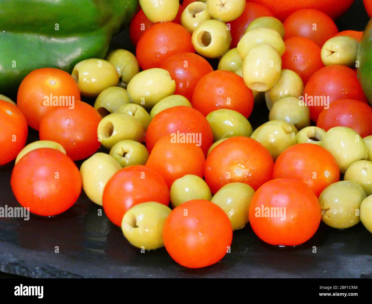 Tomatoes and olives Stock Photo - Alamy