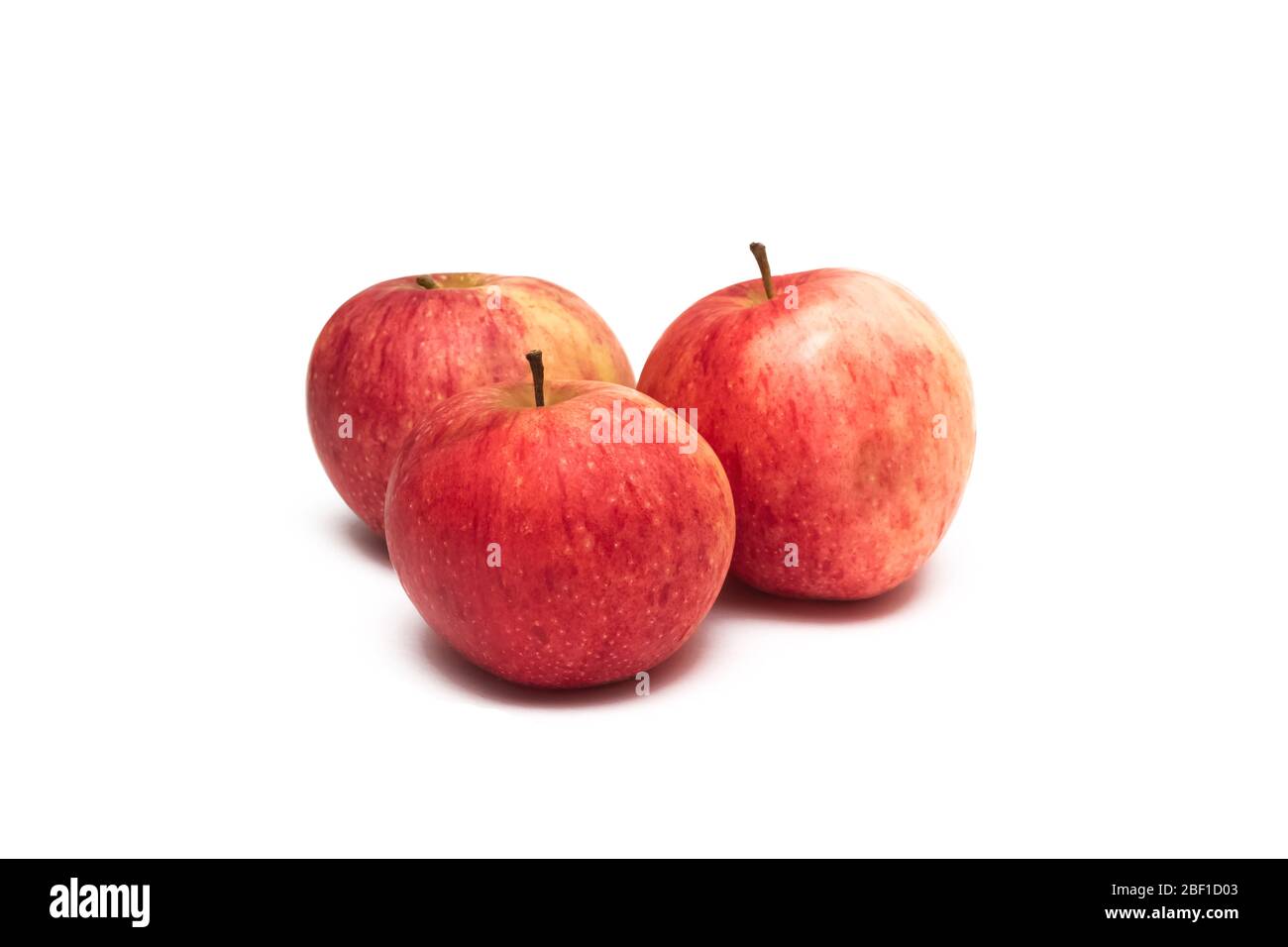 Three red apples, isolated on white background Stock Photo - Alamy