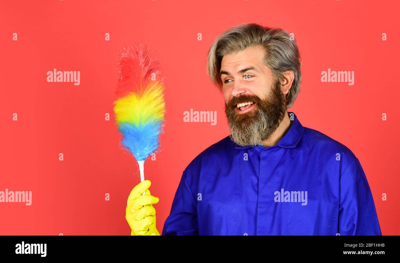 Cleaning apartment. Man use pp duster. Dust allergy. Polypropylene ...