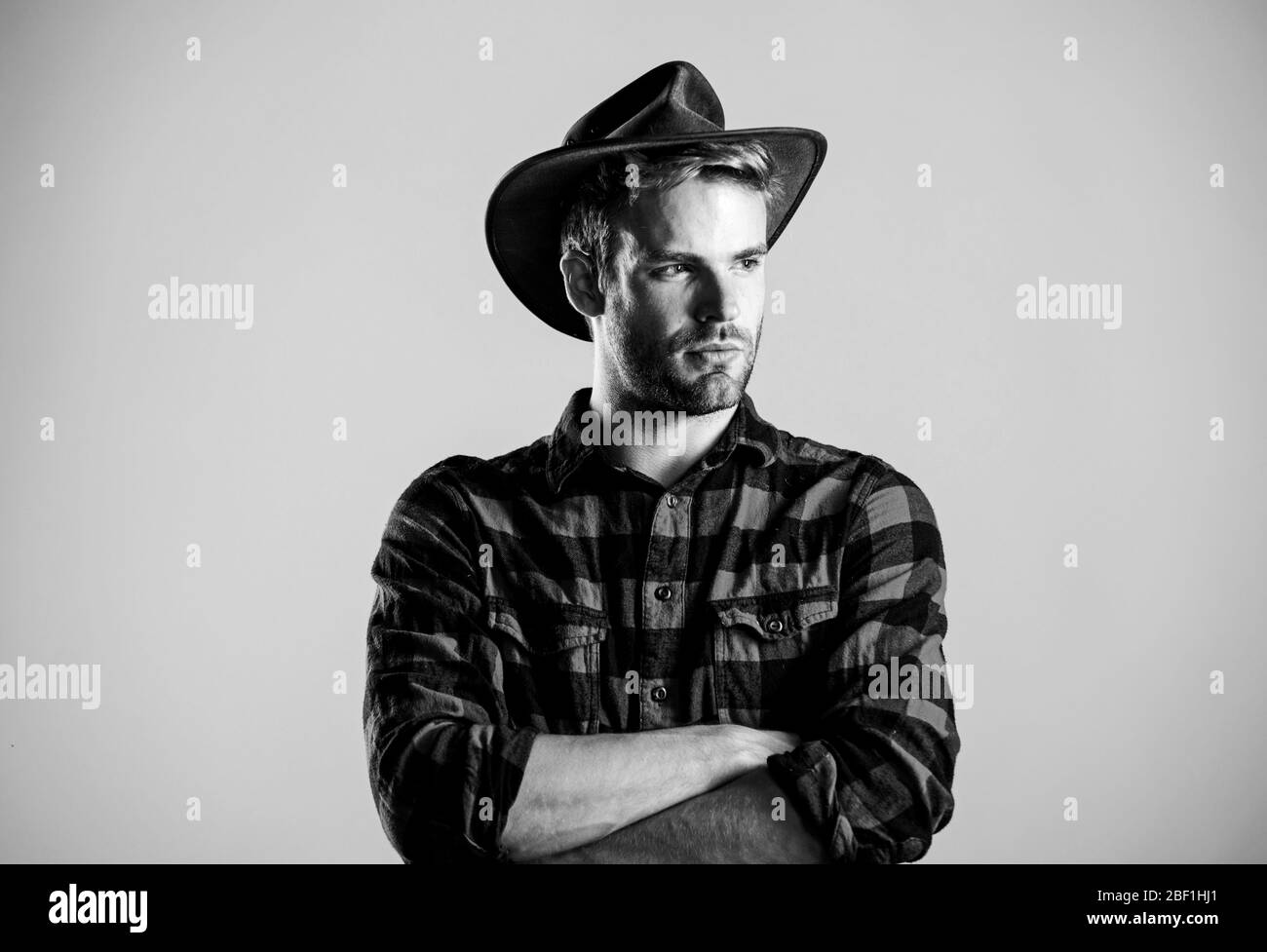 wild west rodeo. Handsome man in hat. cowboy in country side. Western ...