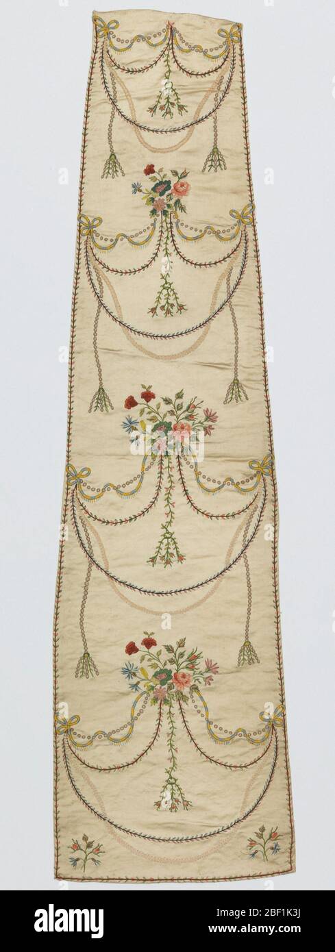 Panel. Long, narrow shaped panel of white satin decorated with ribbon ...