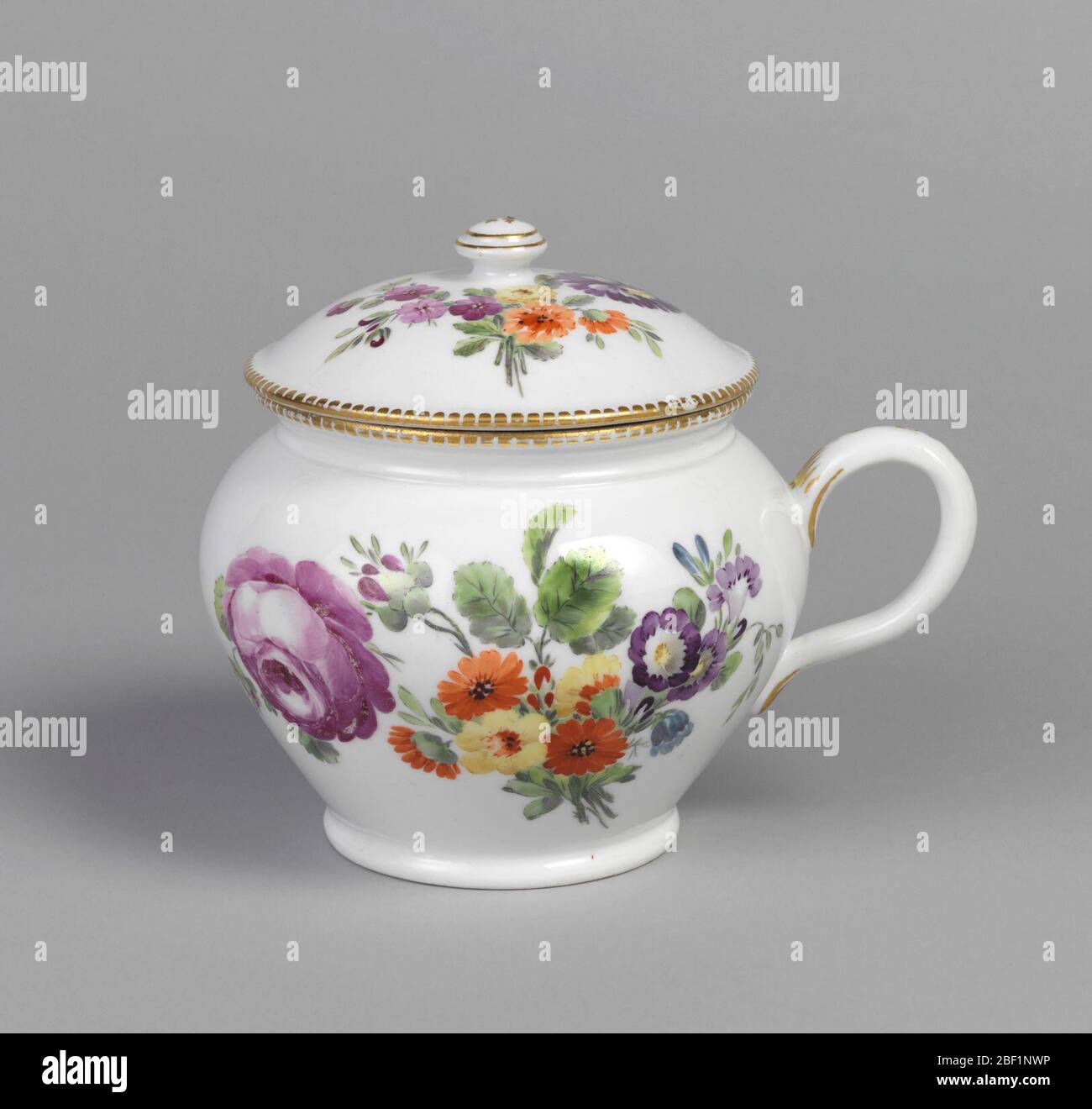 Jug and lid. Bulbous jug with loop handle and lid with button finial ...