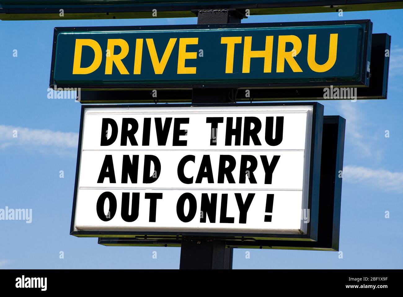 Horizontal shot of a drive thru sign that says Drive Thru and Carry Out ...