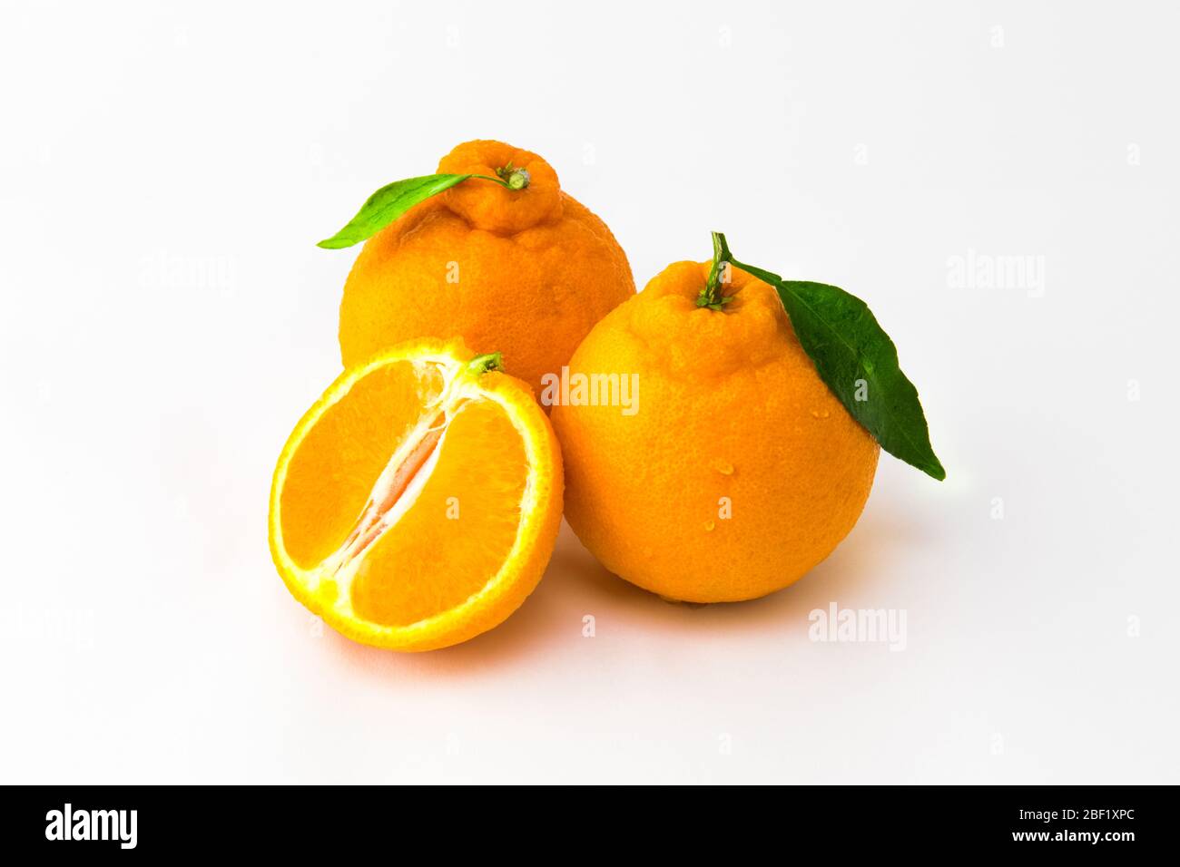 Cross section with fresh orange Hallabong on white background. Fruit ...