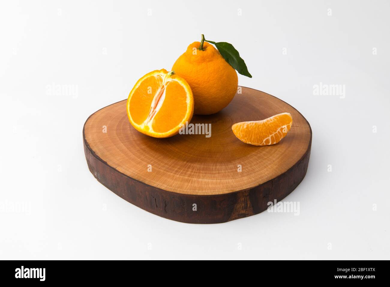 Cross section with fresh orange Hallabong on white background. Fruit ...