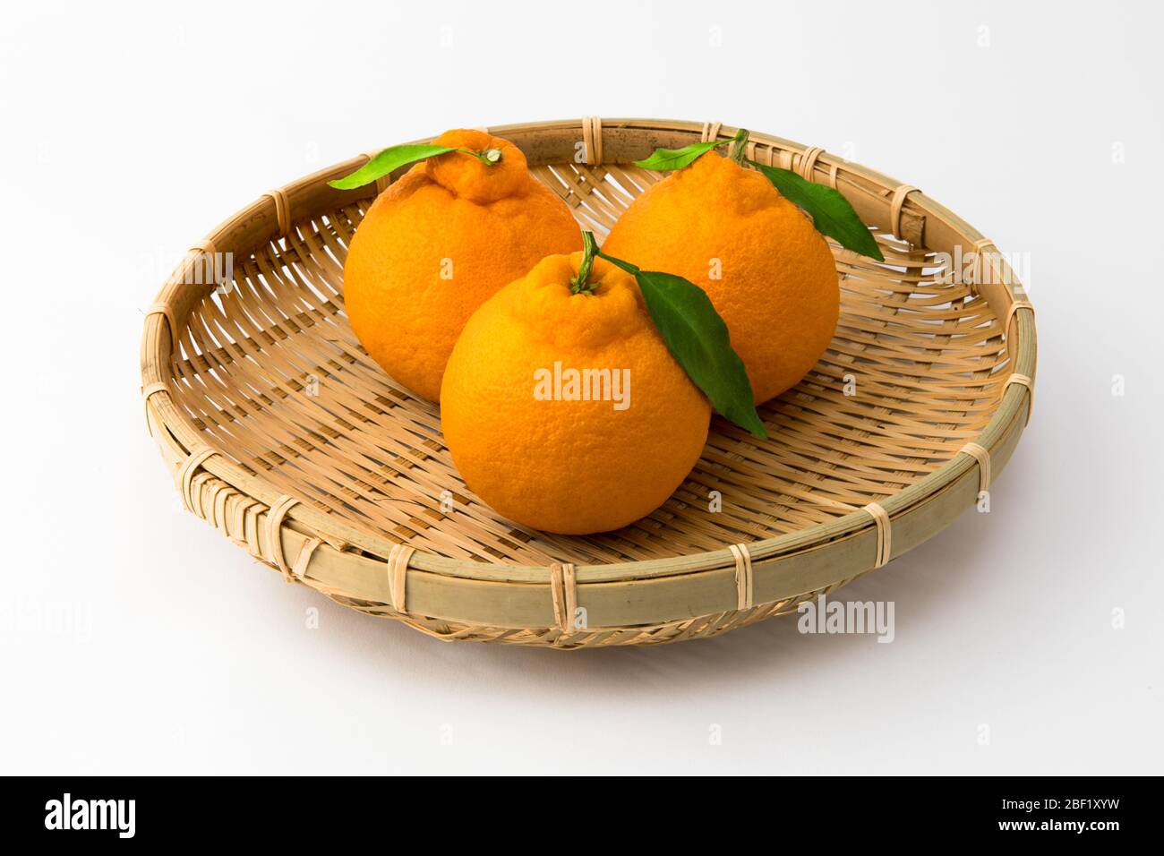 Many orange Hallabongs in a basket. (Korea, Jeju Island specialties ...