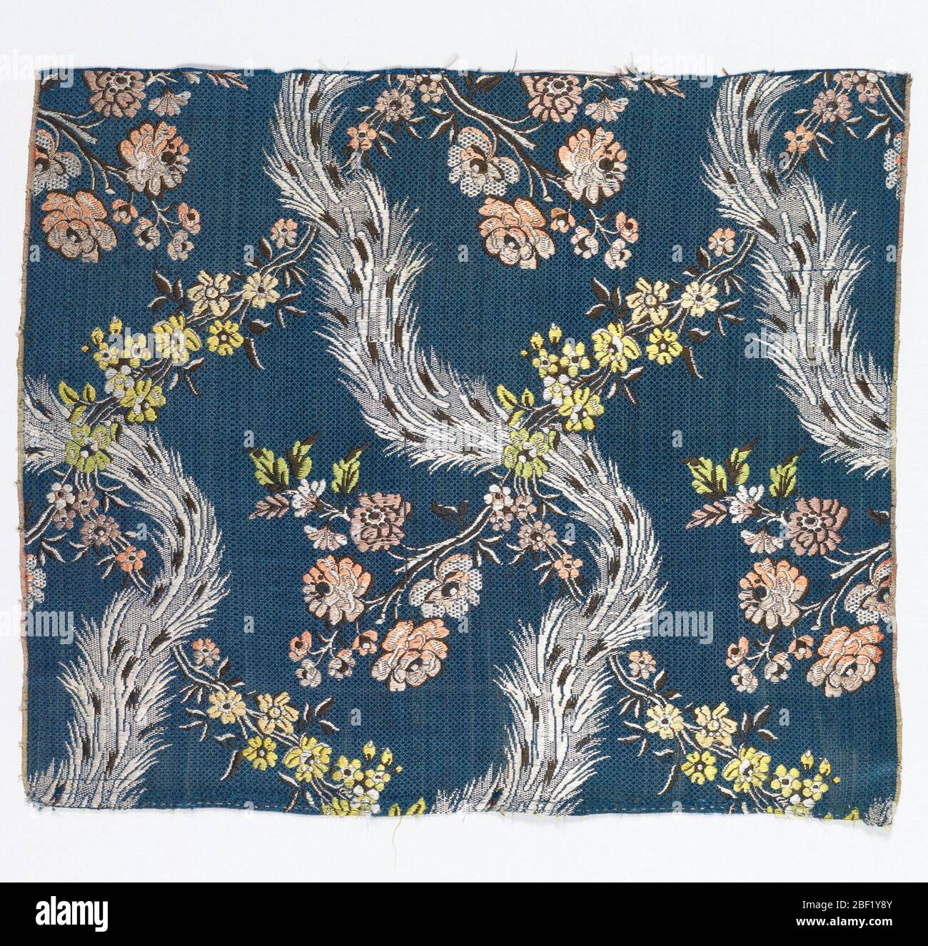 Textile. Blue ground fabric with all-over diaper pattern produced by ...
