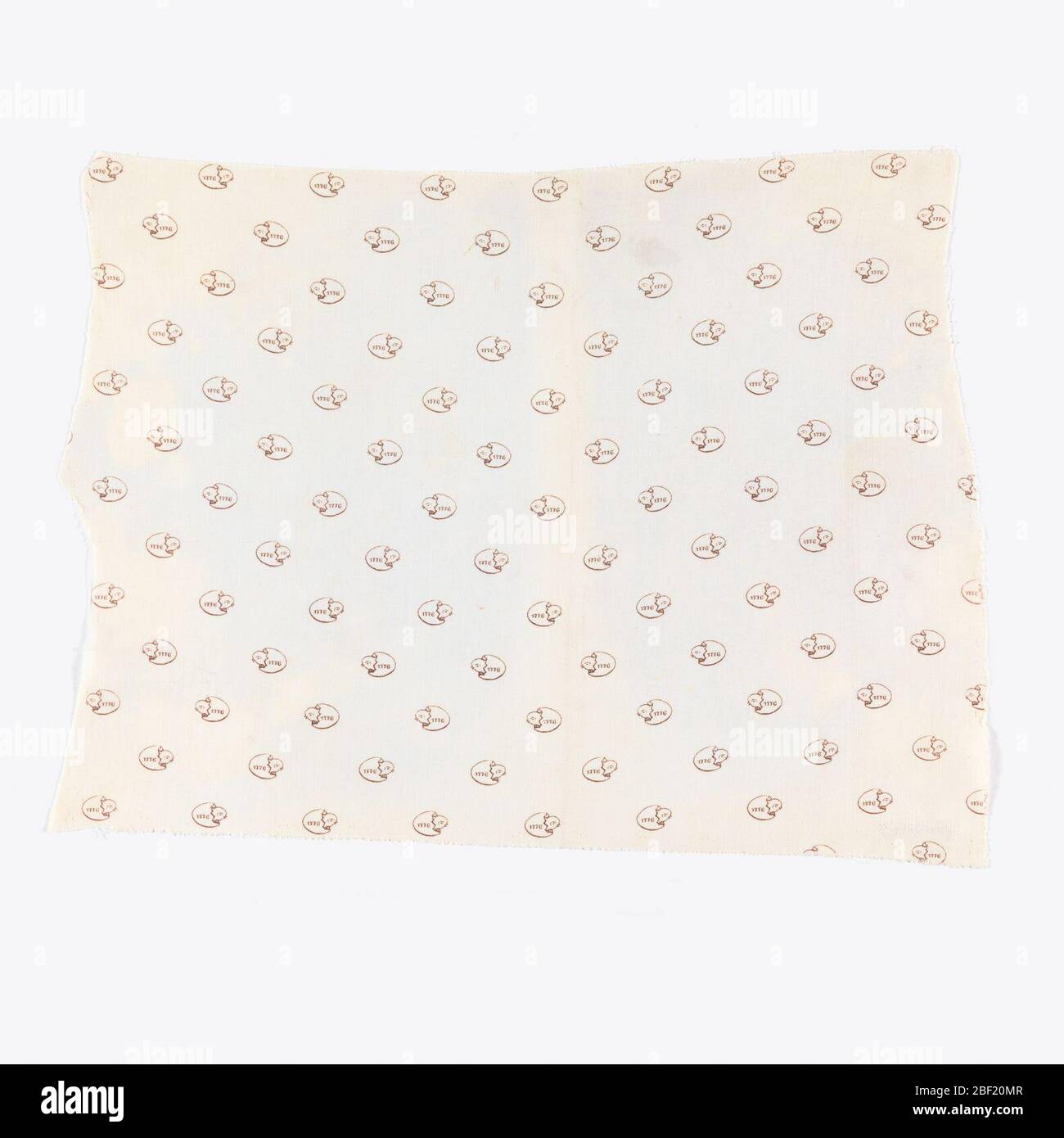 Textile sample. White fabric in a design showing a repeating motif of a ...