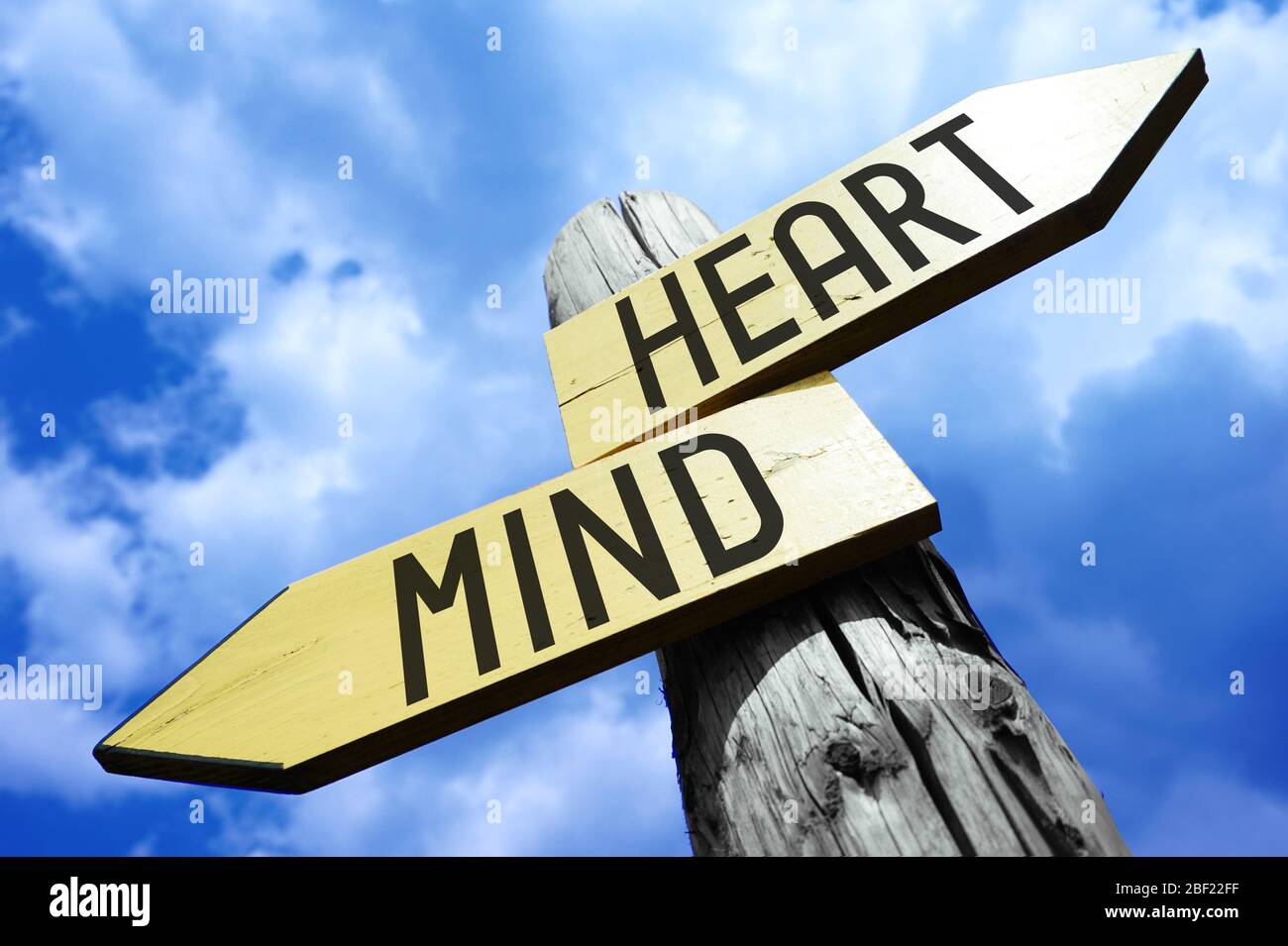 Heart, mind - wooden signpost Stock Photo - Alamy