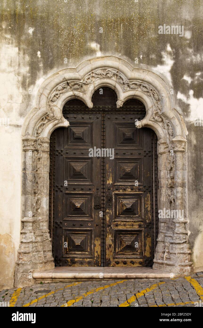 The lateral entrance of Elvas main church, Nossa Senhora da Assuncao ...