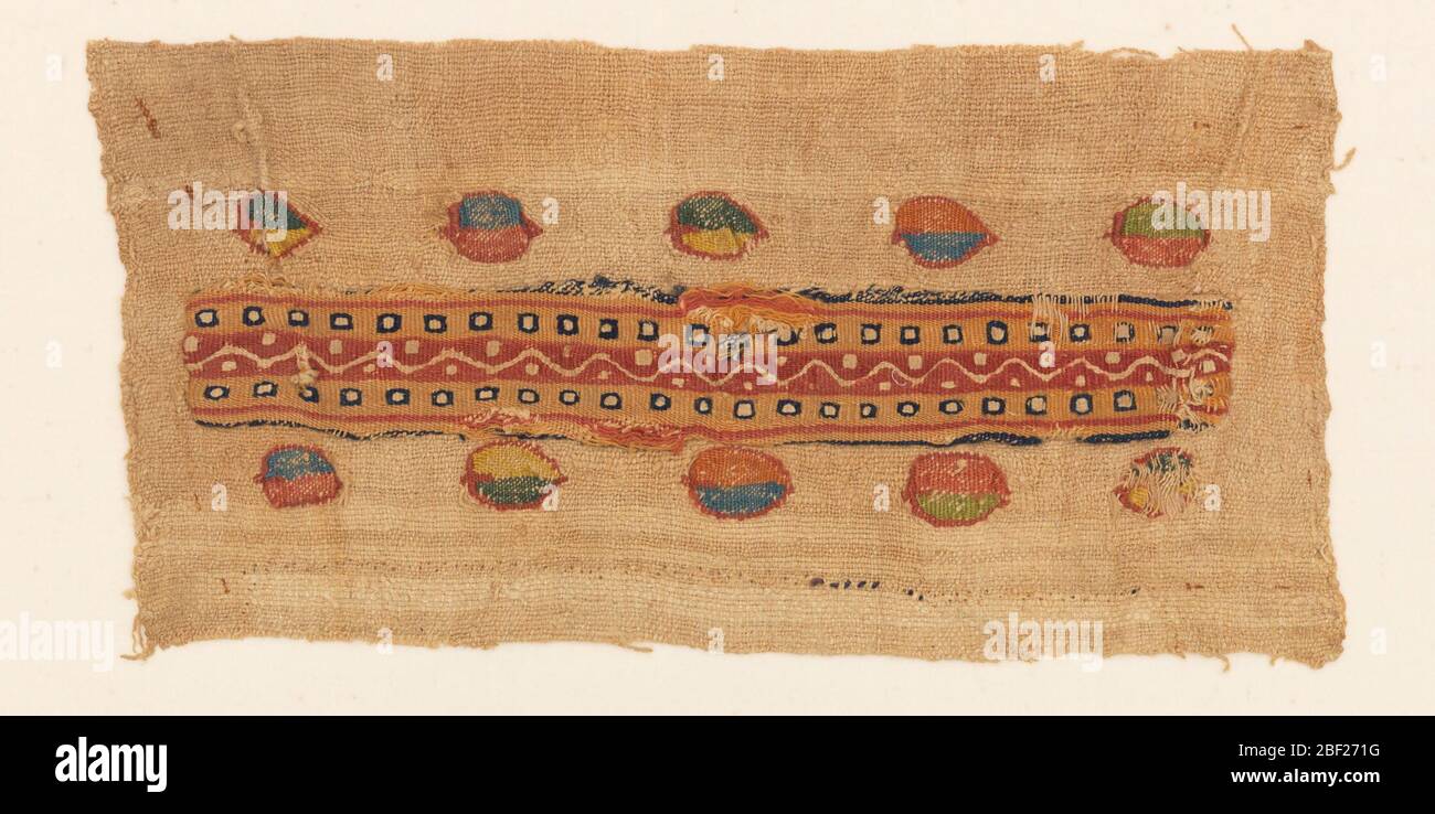 Textile. Woven linen textile showing five small inwoven polychrome ...