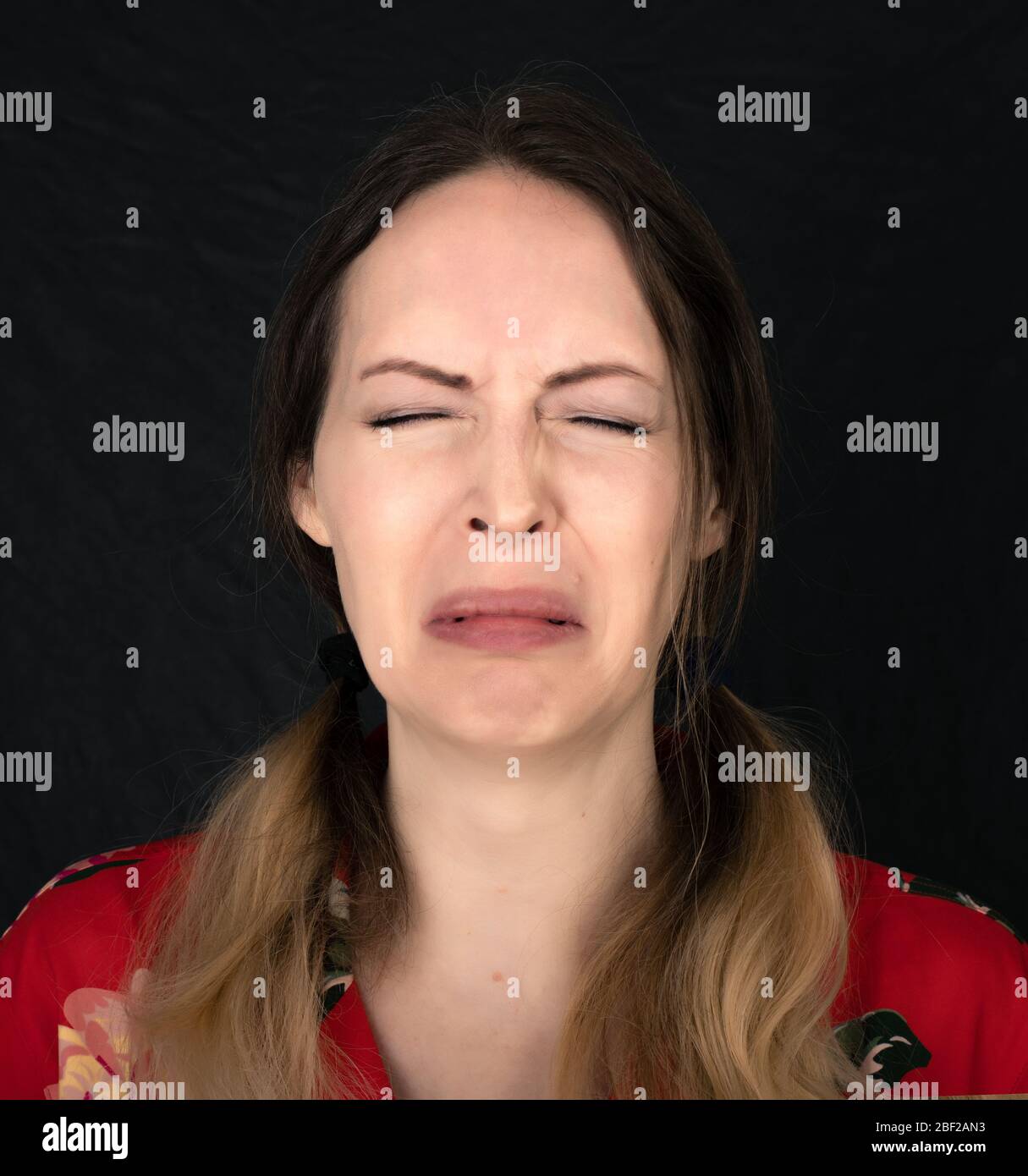 Emotion Frustration and crying. Closed portrait of woman face with ...