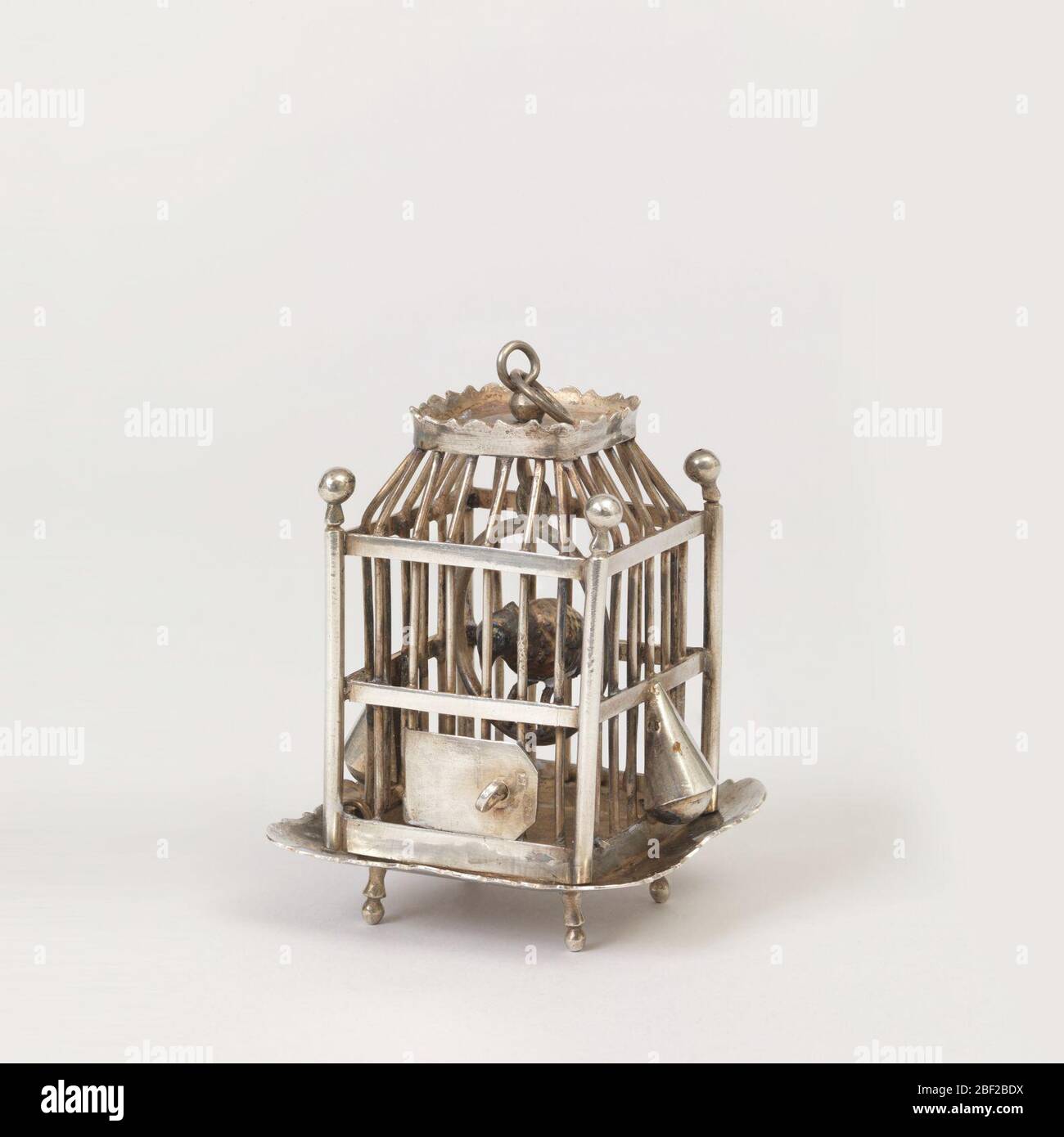 birdcage. Four-footed scrolled tray supports barred cage between four ...