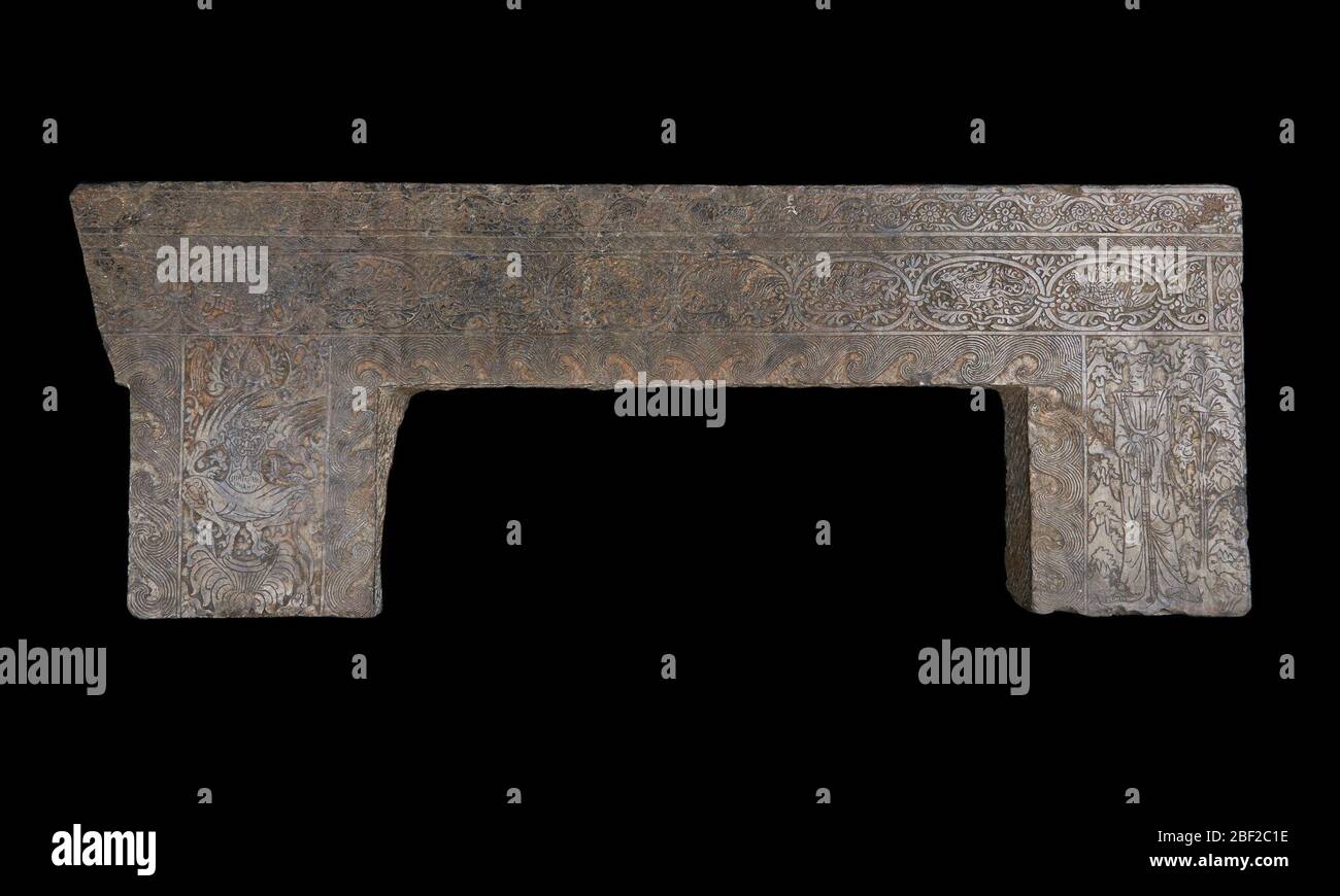 Double lintel decorated with floral and other designs in low relief and ...