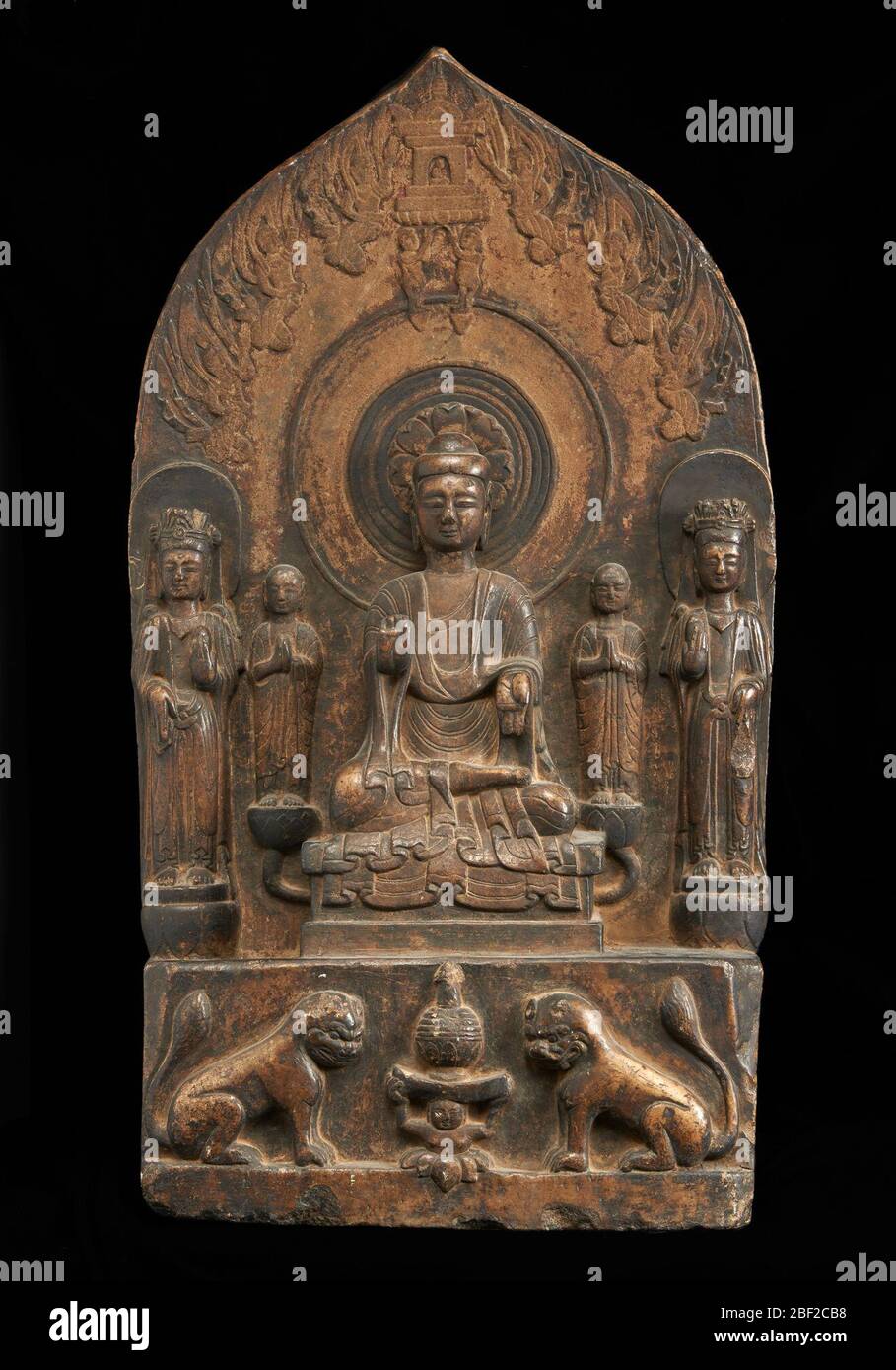 Buddhist tablet seated central figure flankedd by monk and Bodhisattva ...