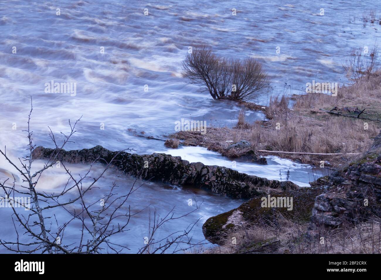 River stream. water flow. rushing river in rocky watercourse. forest ...