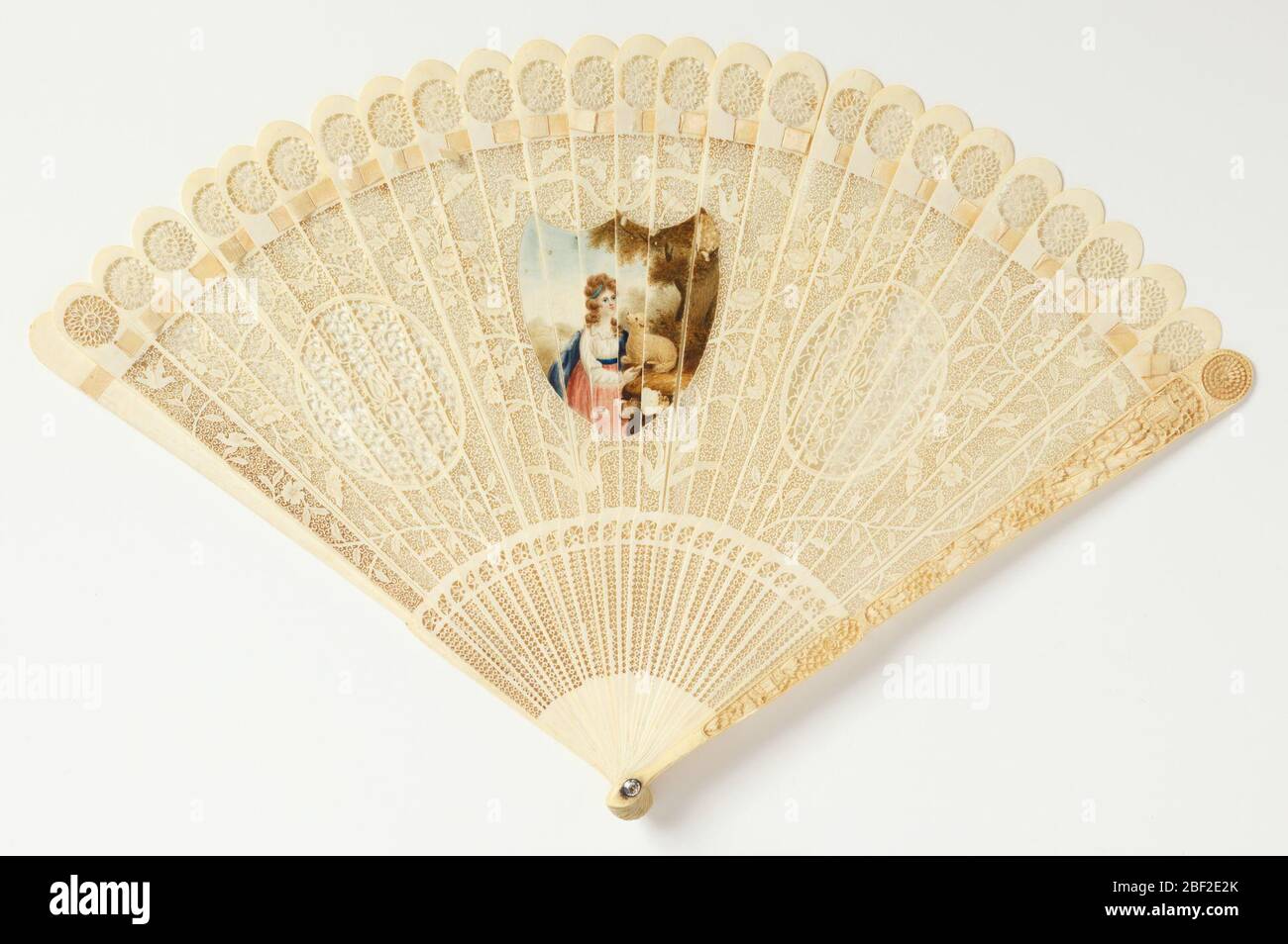 Bris fan. Brisé fan. Carved and pierced ivory sticks with painted ...
