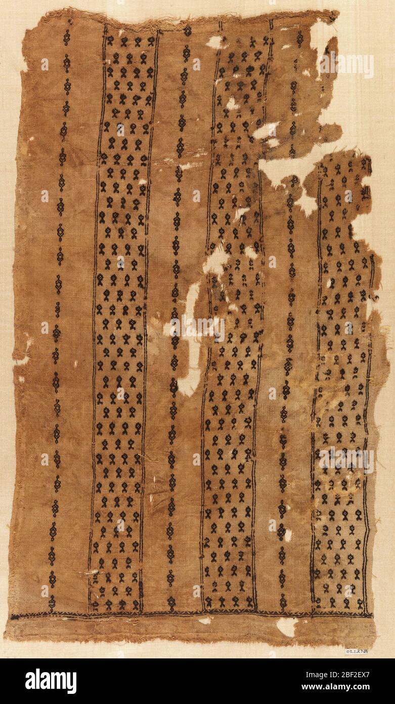 Textile. Vertical stripes of small shapes in brown silk Stock Photo - Alamy