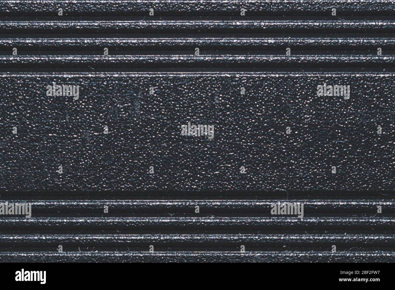 Black plastic texture. ribbed background Stock Photo - Alamy