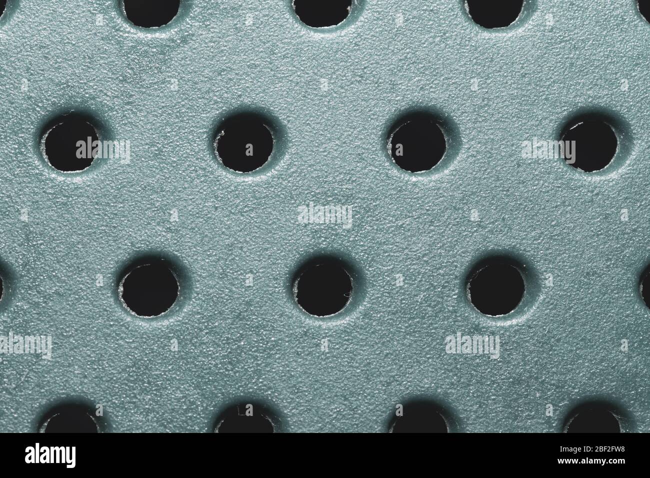 Holes in plastic surface. abstract pattern background Stock Photo - Alamy