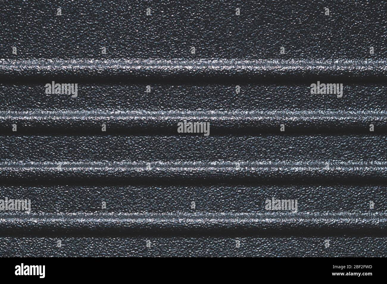 Black plastic texture. ribbed background Stock Photo - Alamy