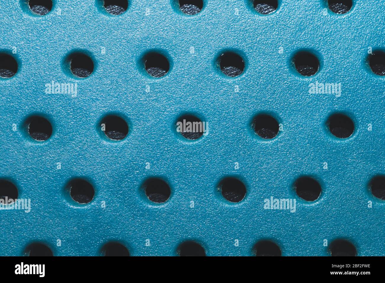 Holes in plastic surface. abstract pattern background Stock Photo - Alamy