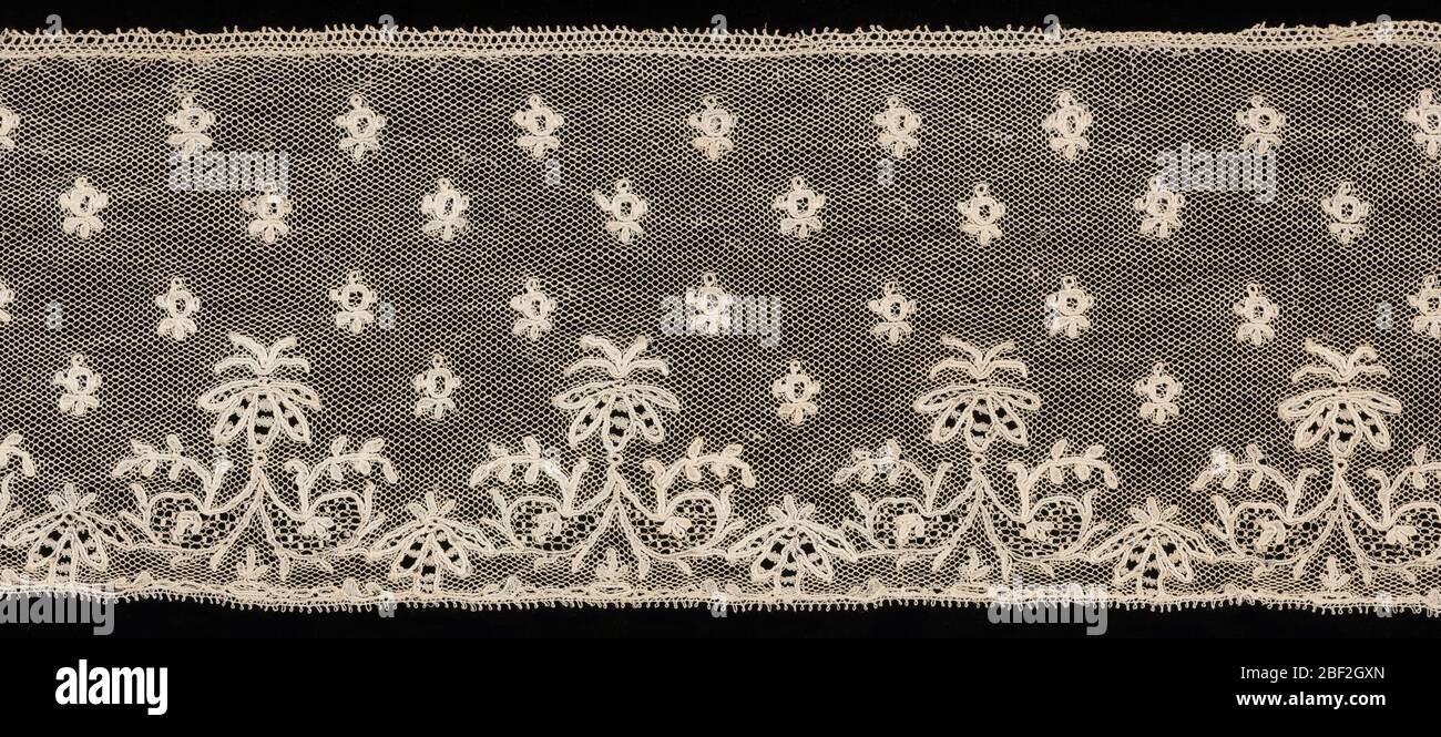 Border. Straight border of Mechlin lace with a design of buds sprinkled ...