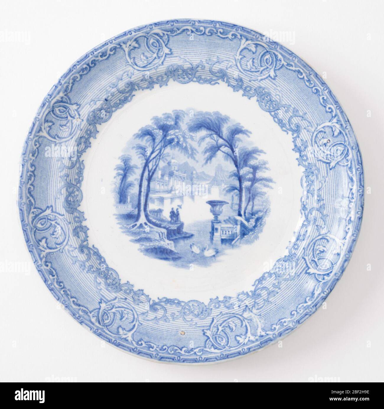 Venus. Plate with blue transfer print showing figures and swans in a ...