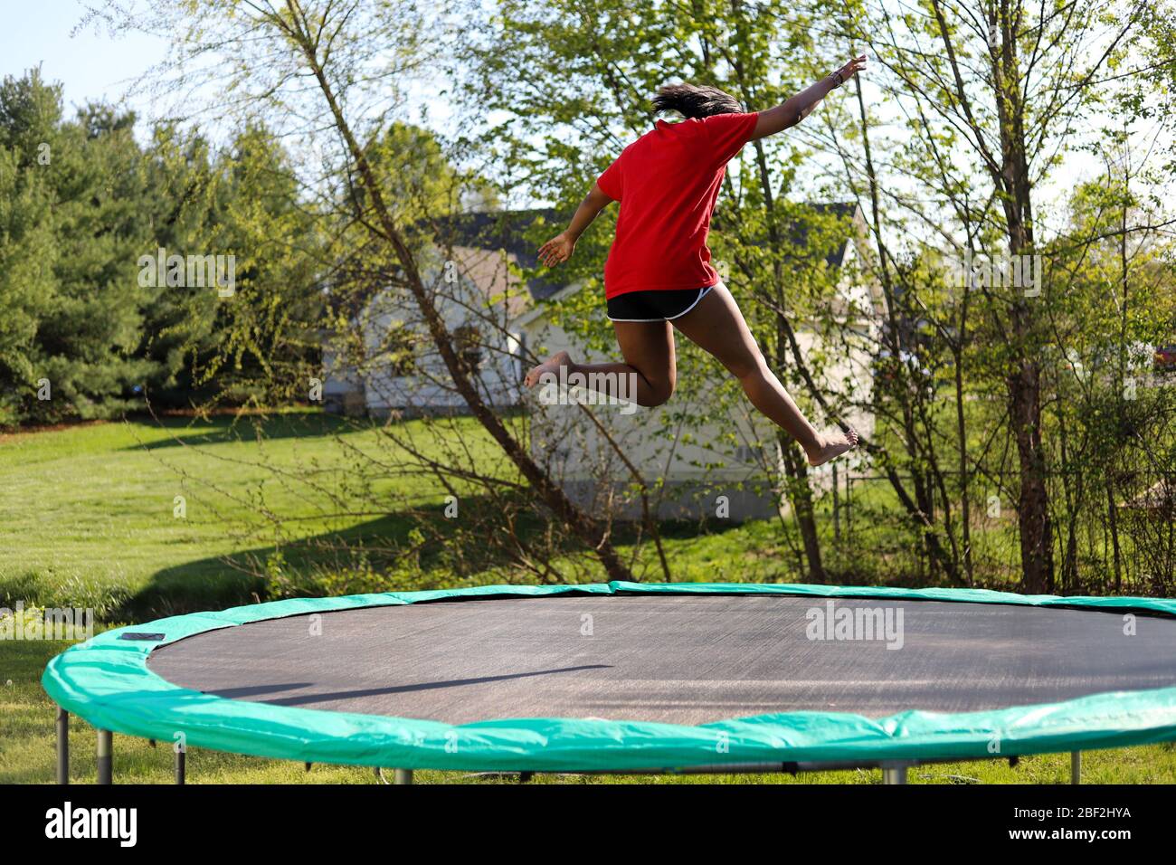 Teenage girl jumping on trampoline hi-res stock photography and images ... Teenage girl jumping on trampoline hi-res stock photography and images ...