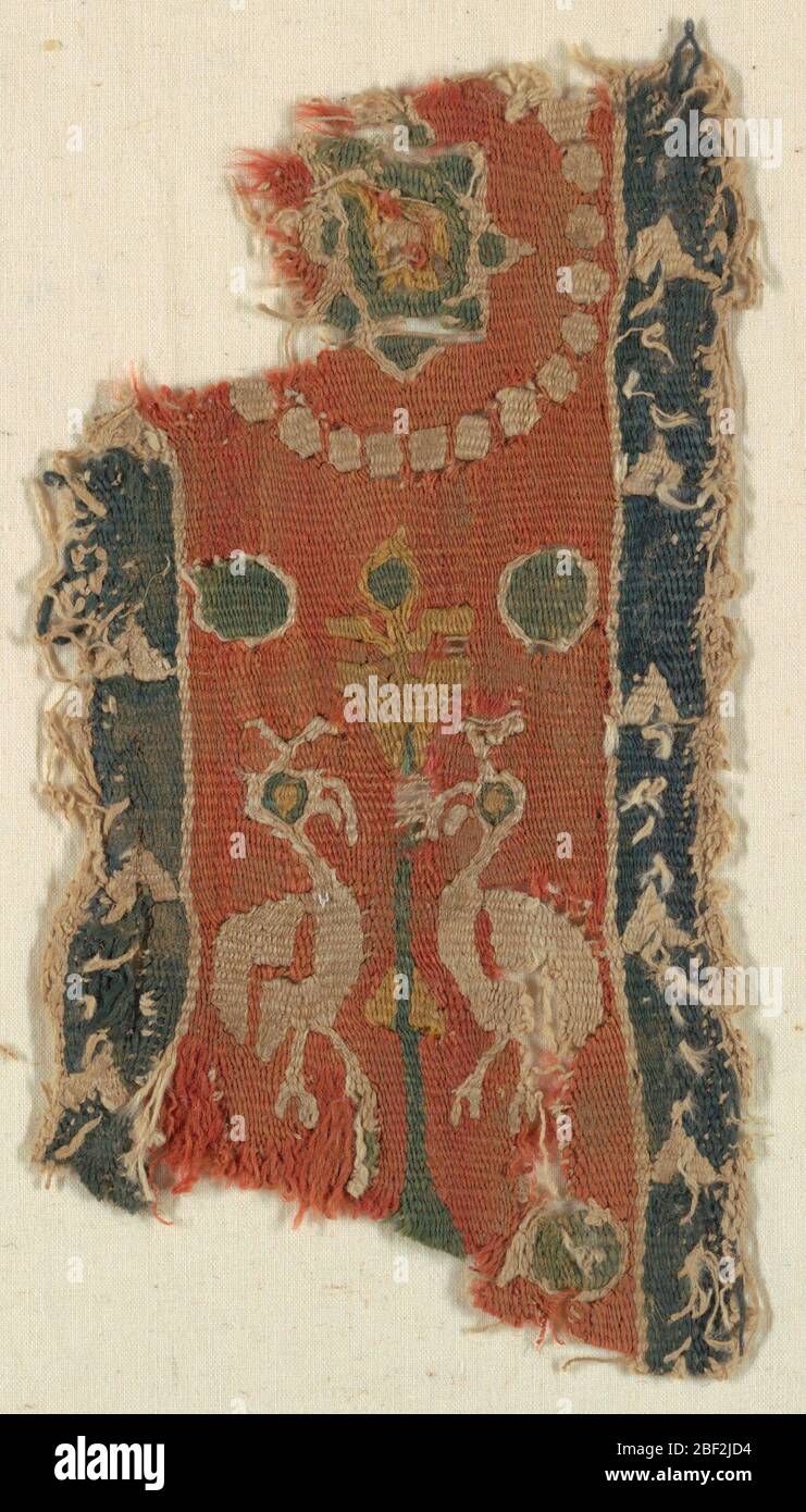 Textile. Tapestry band in Sassanian style shows two pelicans on either ...