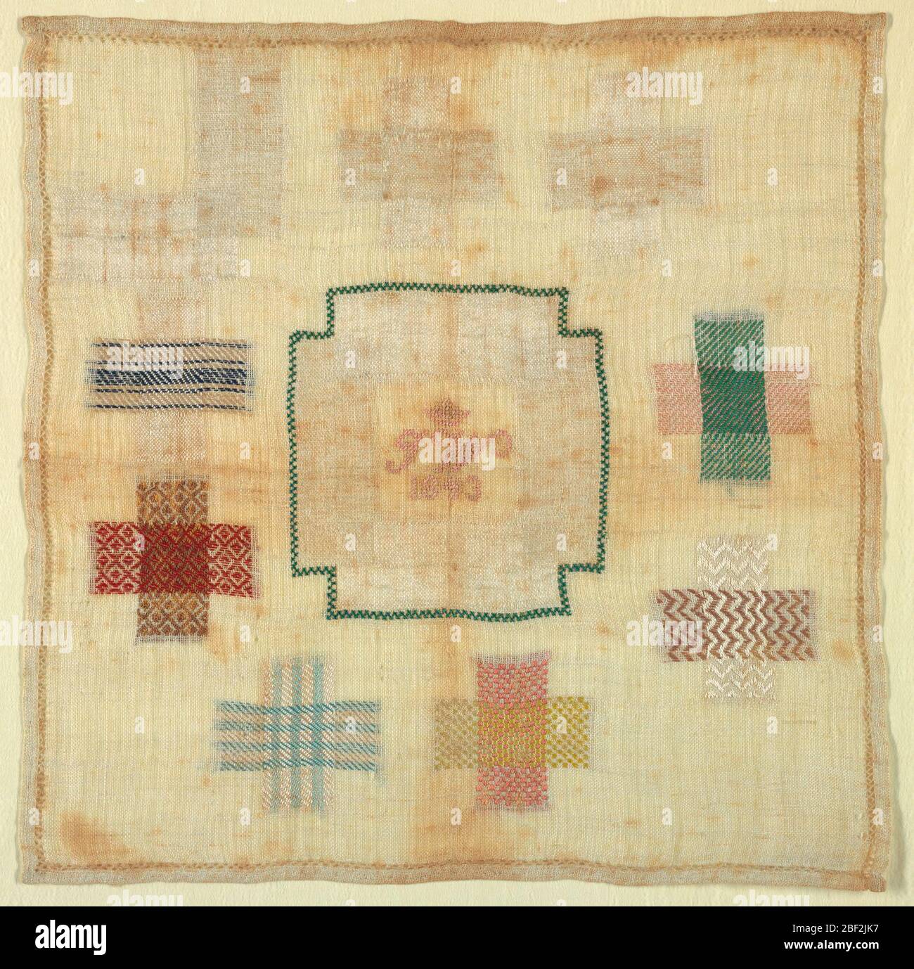 Darning sampler. Eight darning crosses, central patch "darned" and two ...