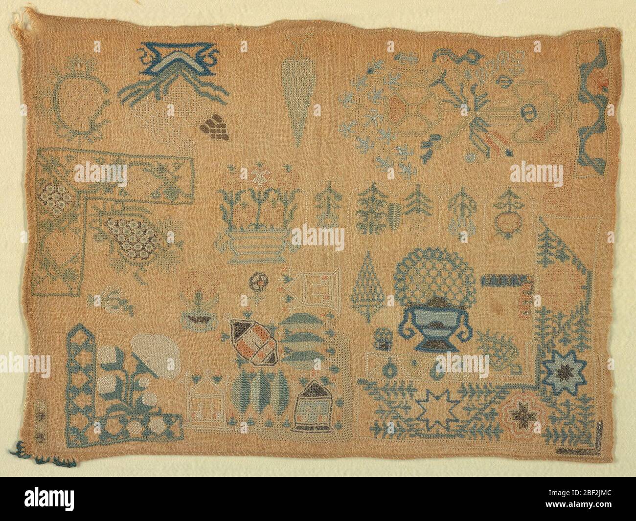 Sampler. Isolated motifs and corner patterns. Note: stitches make ...