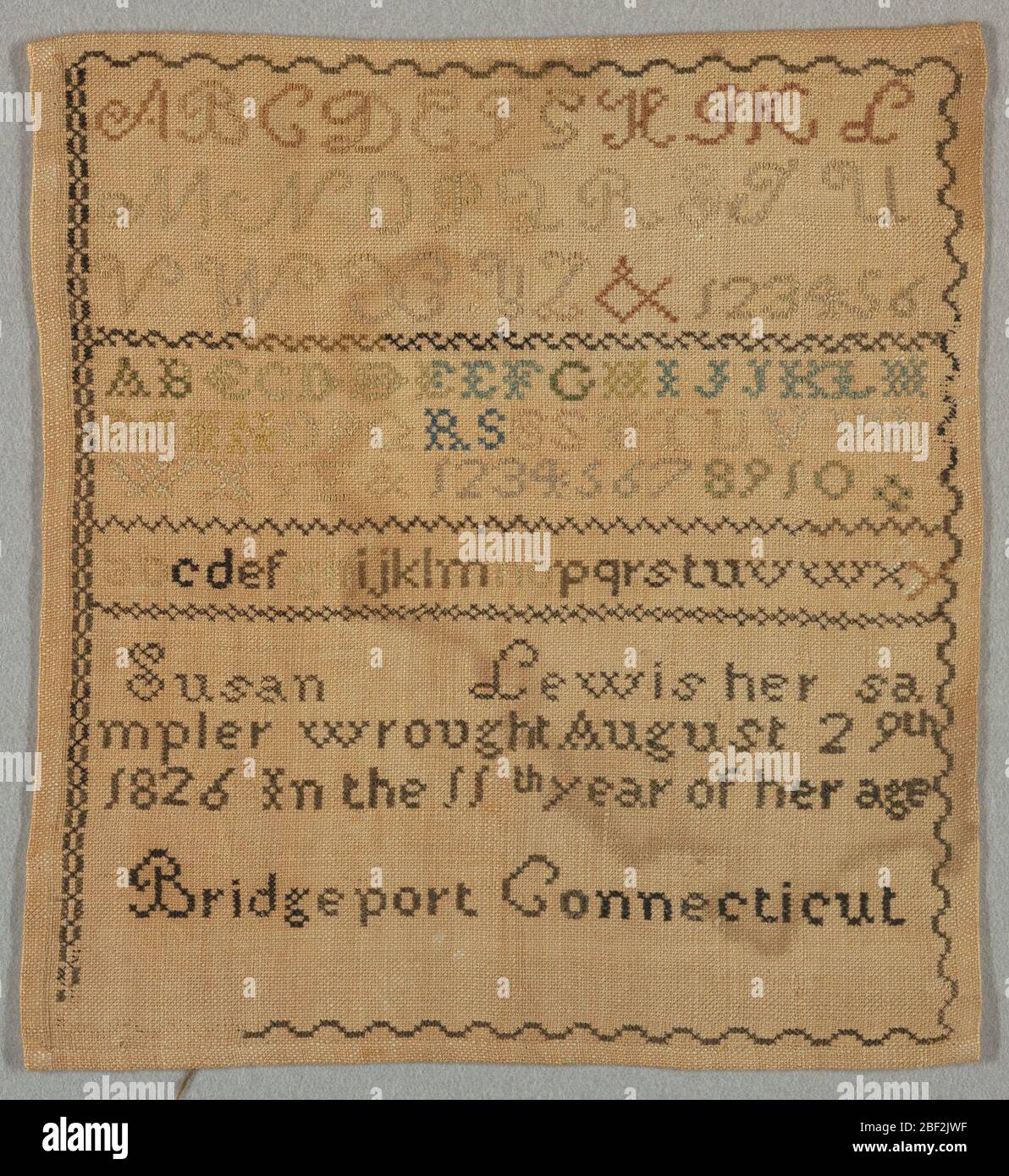Sampler. Three alphabets and two sets of numerals, separated by narrow ...