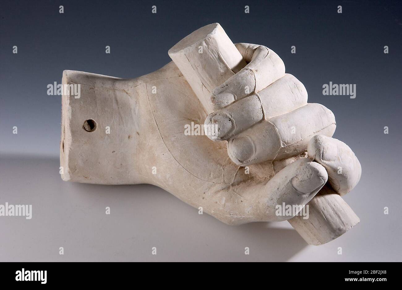 Cast of an Unidentified Right Hand Grasping a Rod. There are many ...
