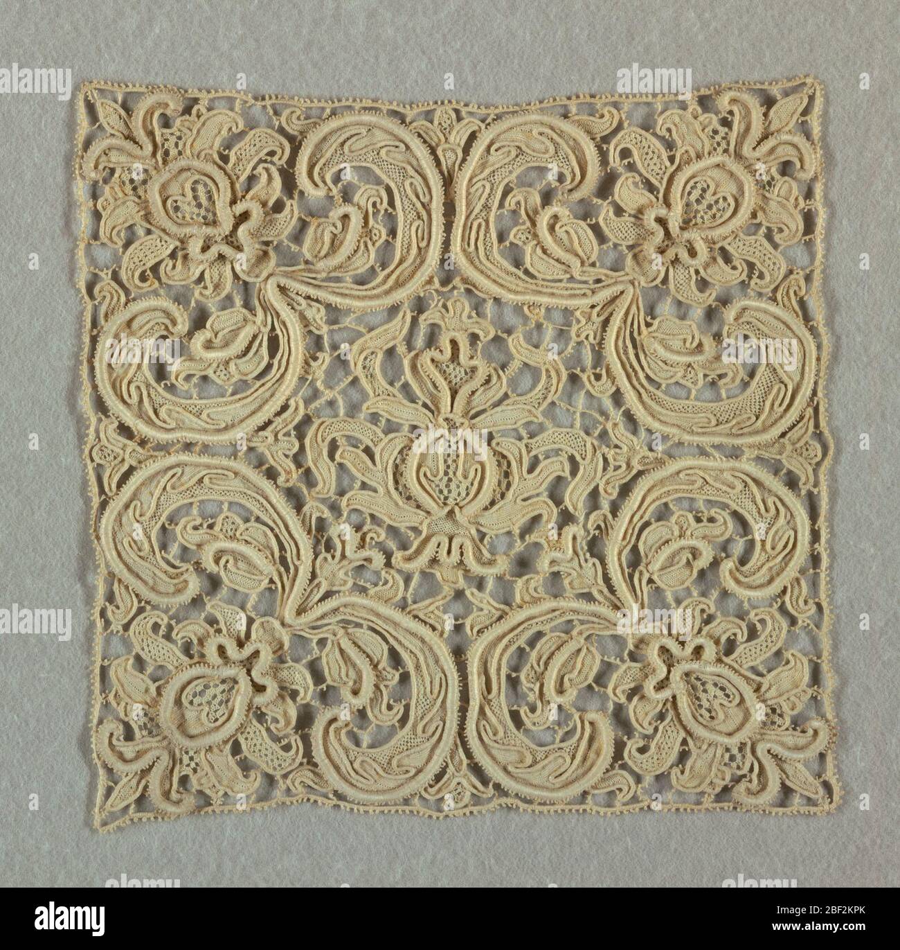 Foliated forms surrounding central floral motif hi-res stock ...