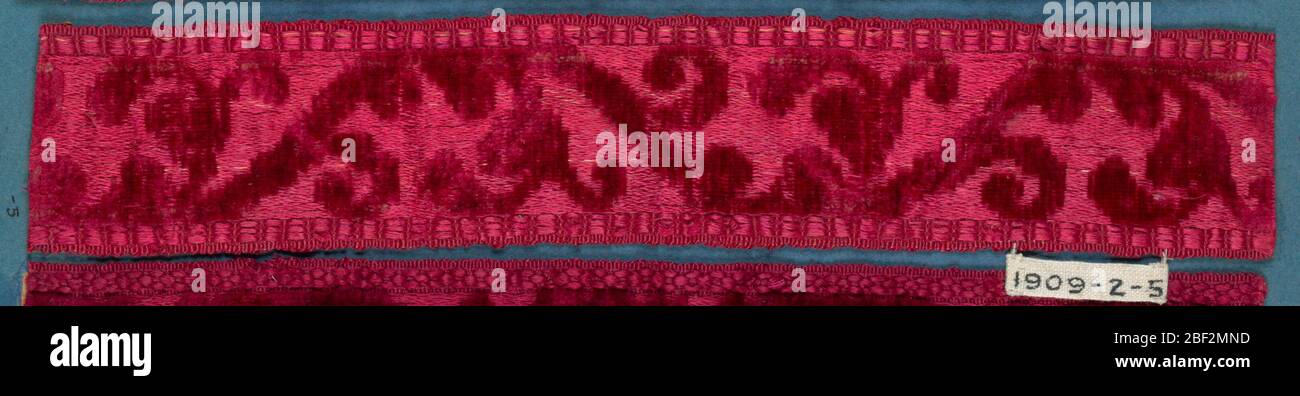 Trimming. Red trimming fragment in a design of an angular stem with ...