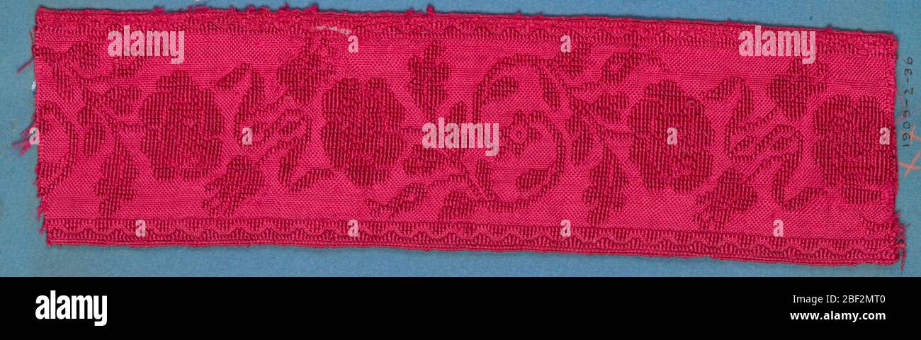 Trimming. Red trimming fragment in a design of roses with buds and ...